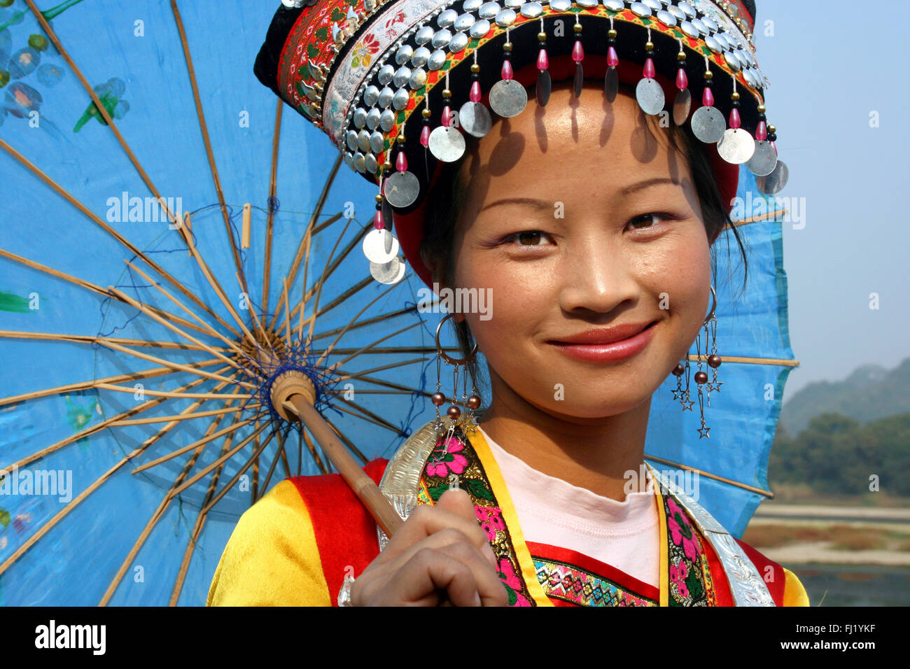 Woman in Guilin with traditional costume, Guangxi Province Stock Photo ...