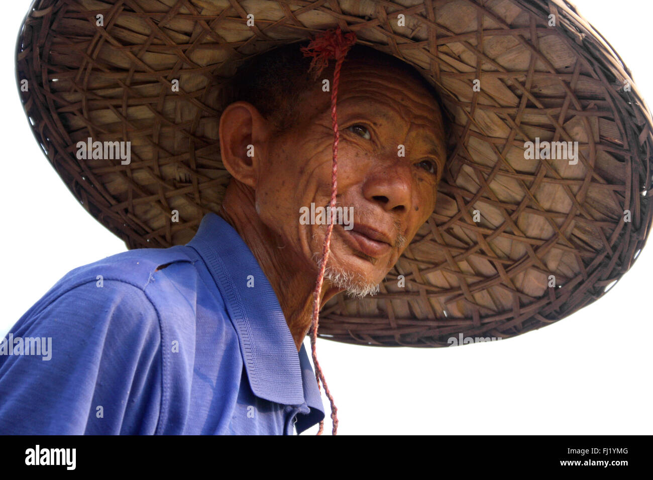 Farmer with beautiful hat in Yangshuo , Guangxi, China Stock Photo - Alamy