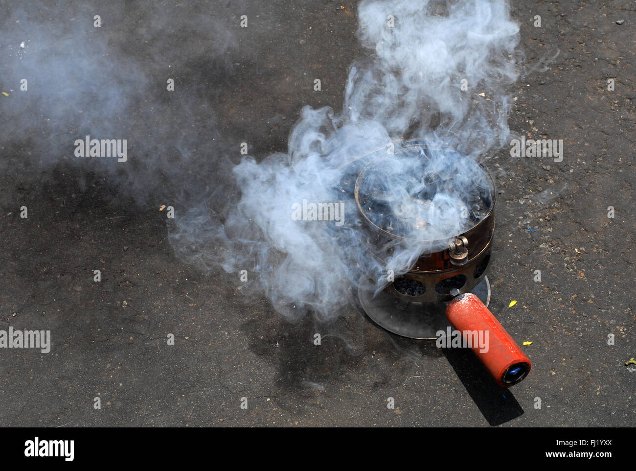 Malang, Indonesia. 28th Feb, 2016. Artist brings appliance burnt ...