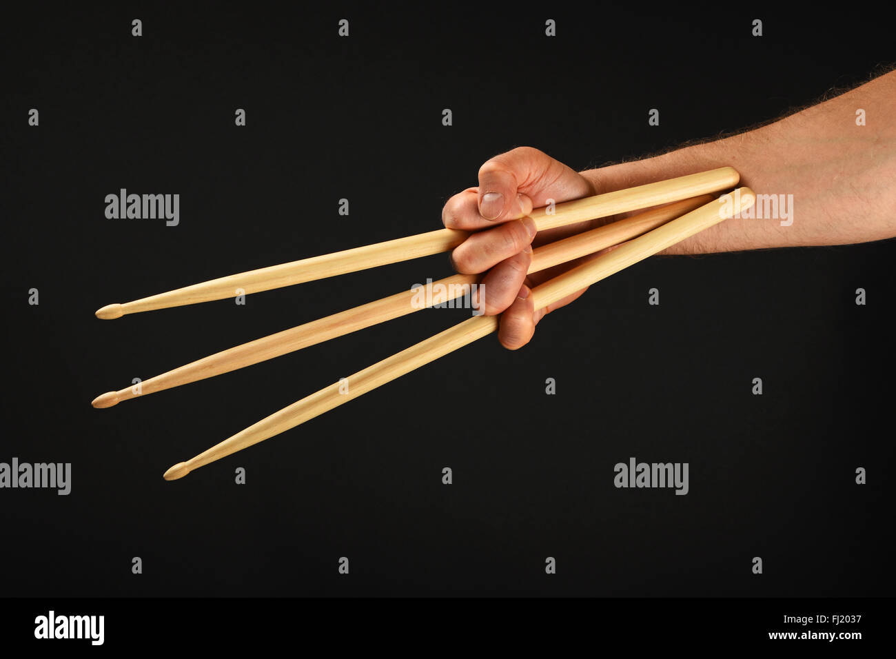 Famous wolverine claws heroic gesture, man hand holding three wooden ...