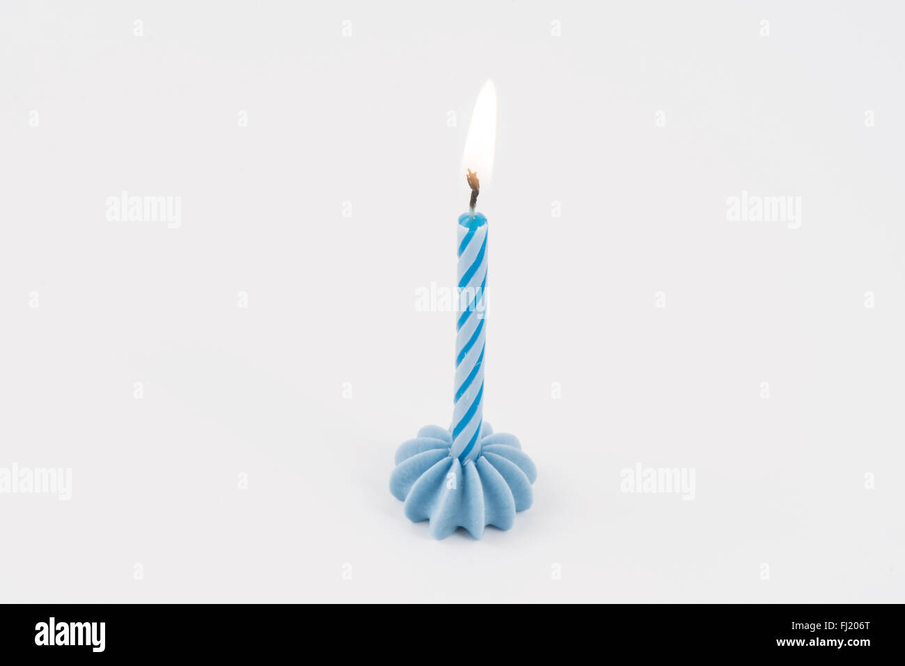 Birthday blue candle on white background Stock Photo - Alamy