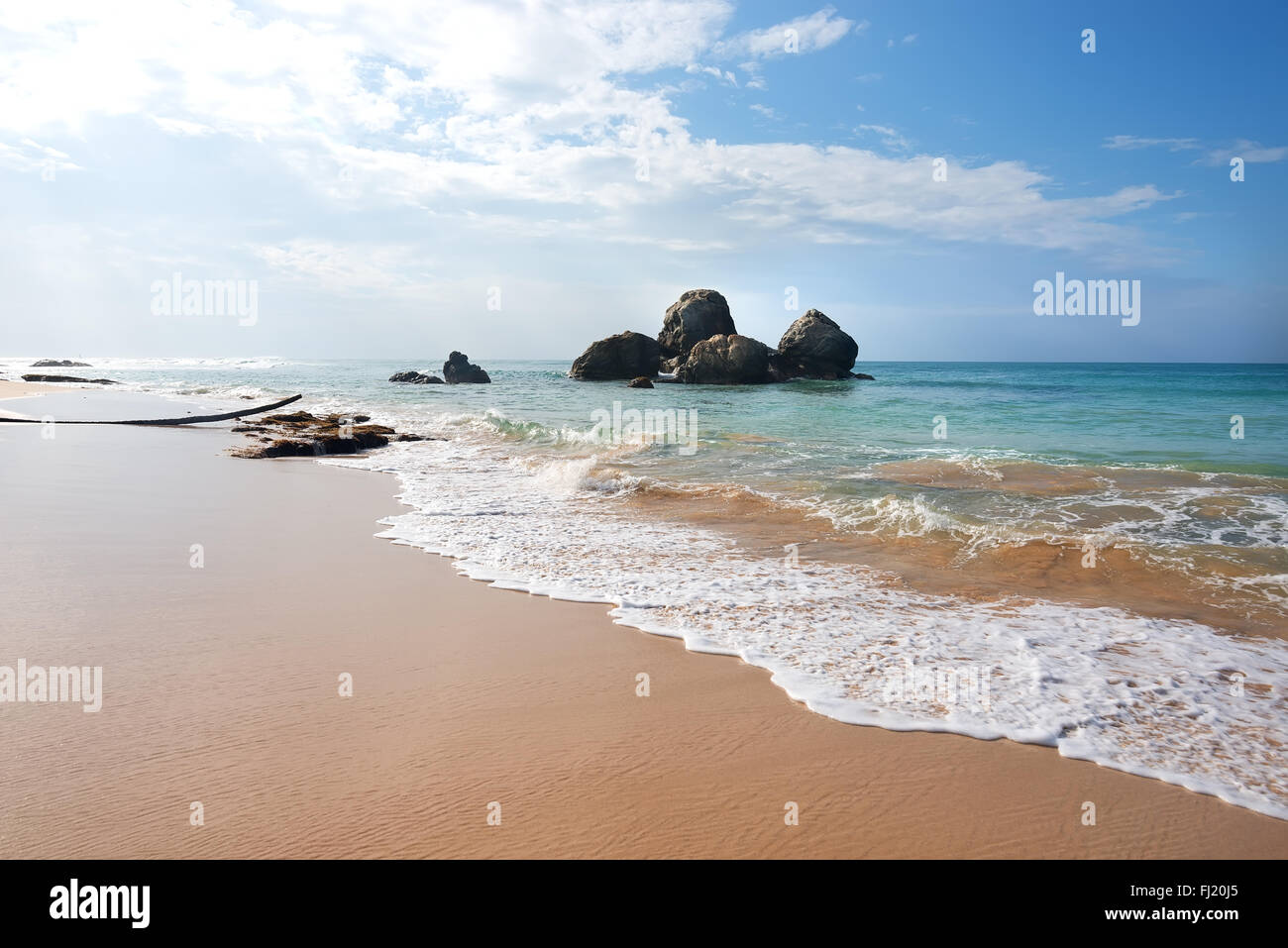 Tropical beach with stones hi-res stock photography and images - Alamy