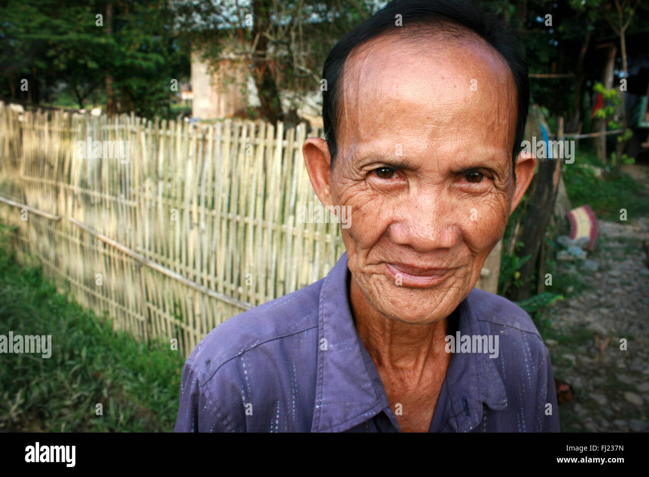 Portrait of old Laotian man with wrinkles , Vang Vieng Stock Photo - Alamy