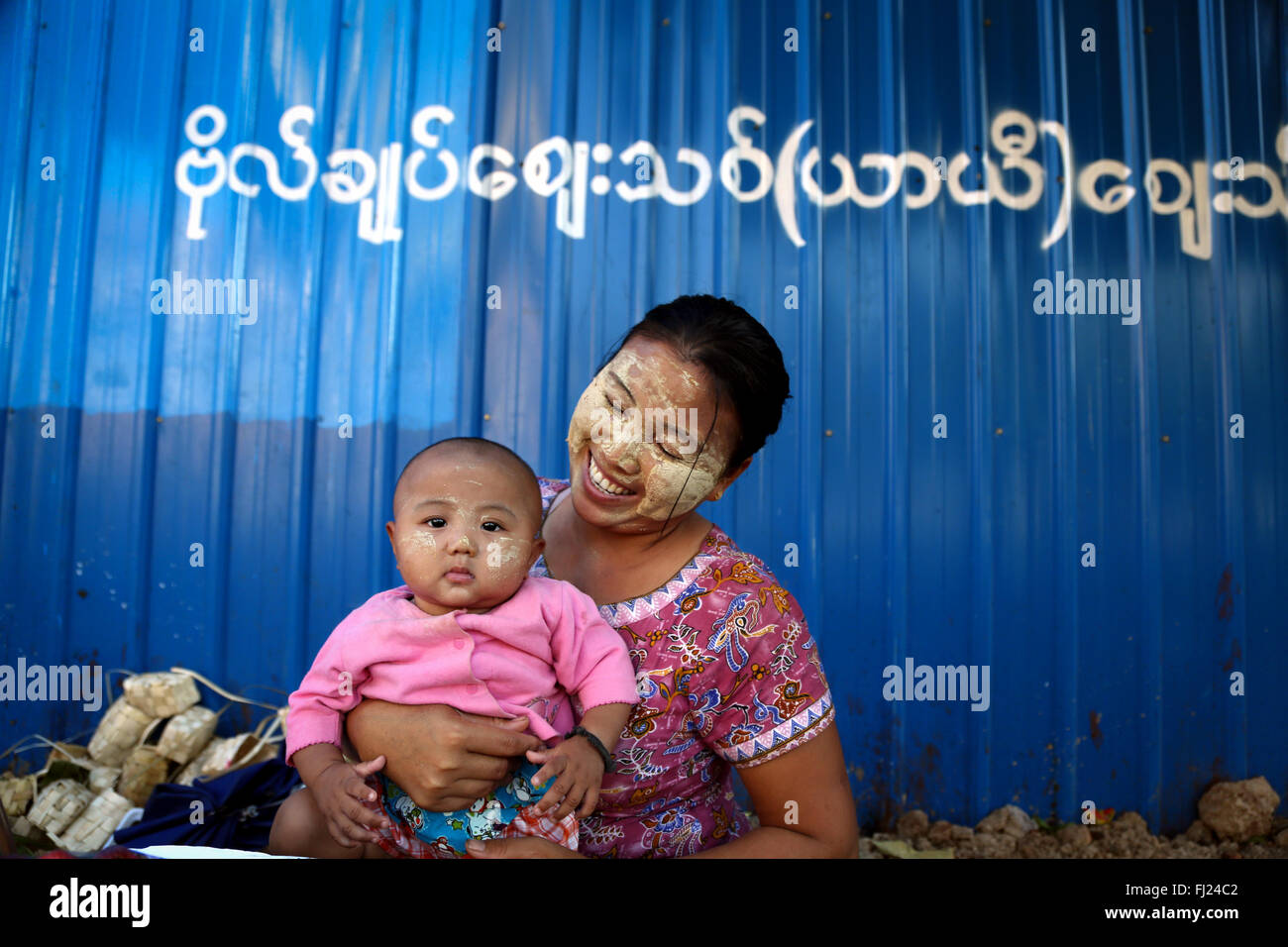 Smiling happy burmese family hi-res stock photography and images - Alamy