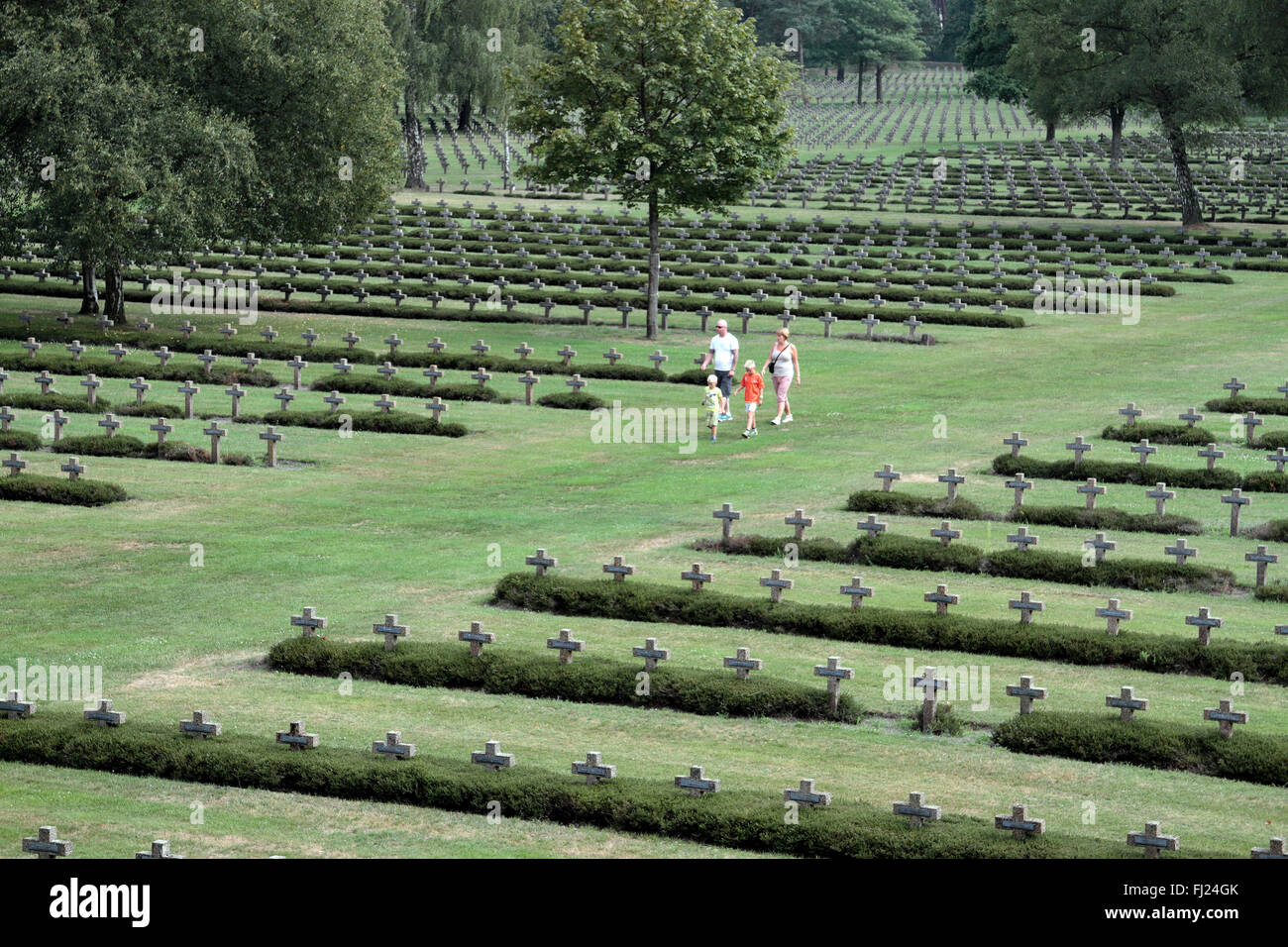 A family walk through the many crosses/headstones of the Lommel German ...