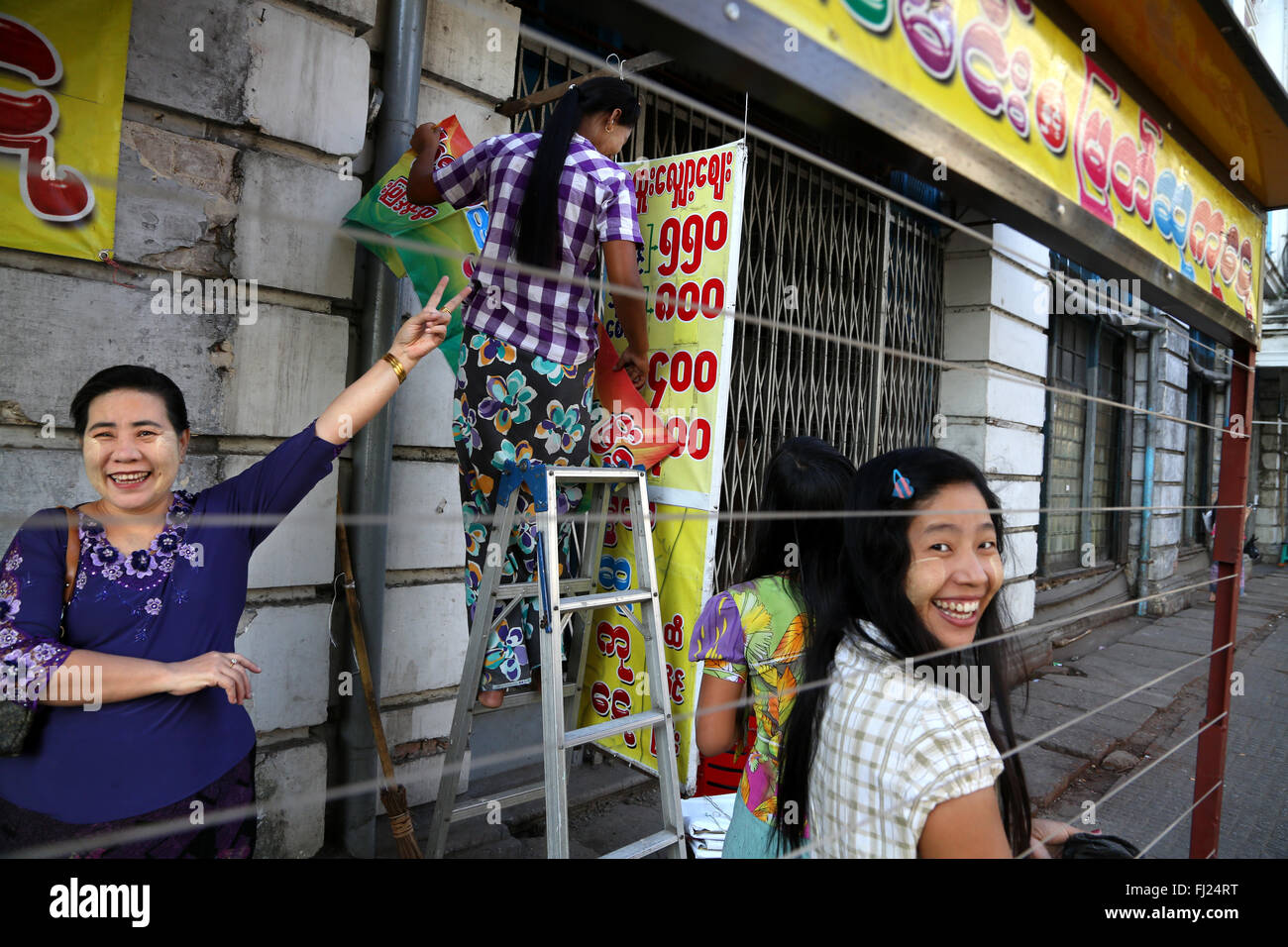 People in a street of Rangoon, Myanmar Stock Photo - Alamy