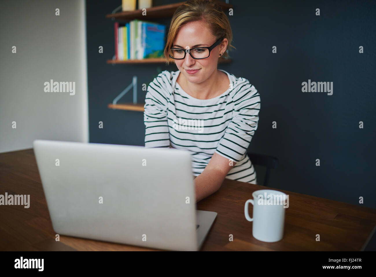 woman starting business working at office with a laptop Stock Photo - Alamy