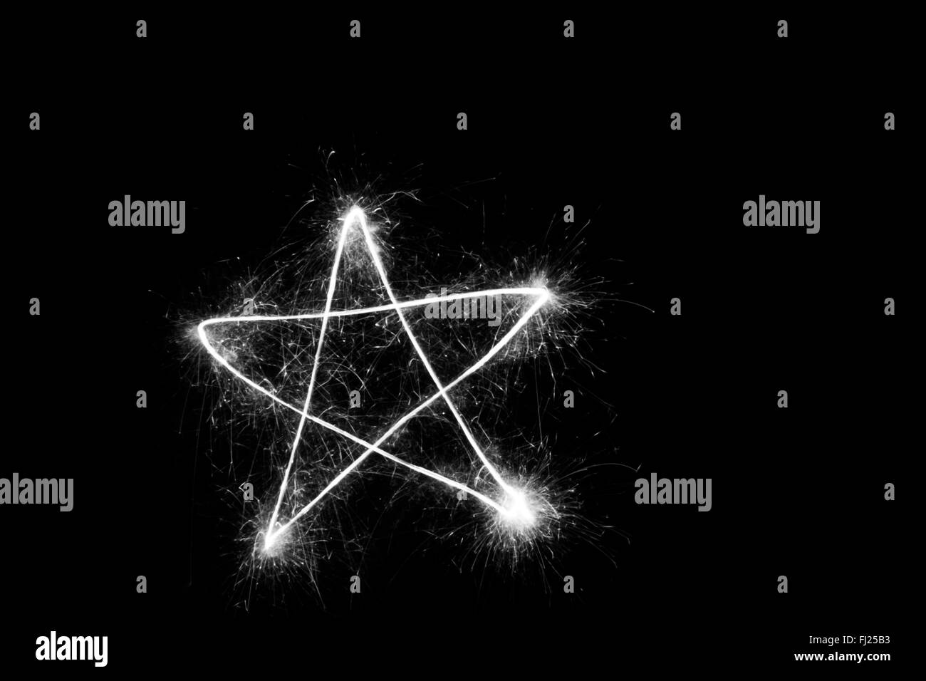 star drawn with sparkler Stock Photo - Alamy