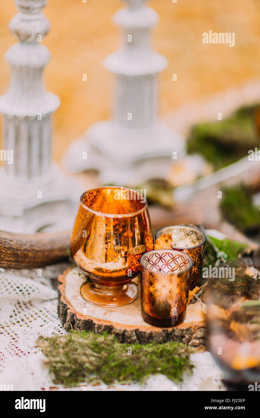 Lovely candles on stump with moss the woods Stock Photo - Alamy