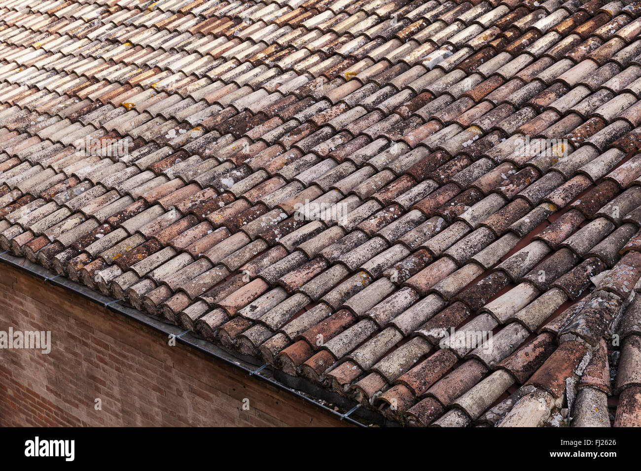 Old weathered red tile roof close-up photo. Background texture Stock ...