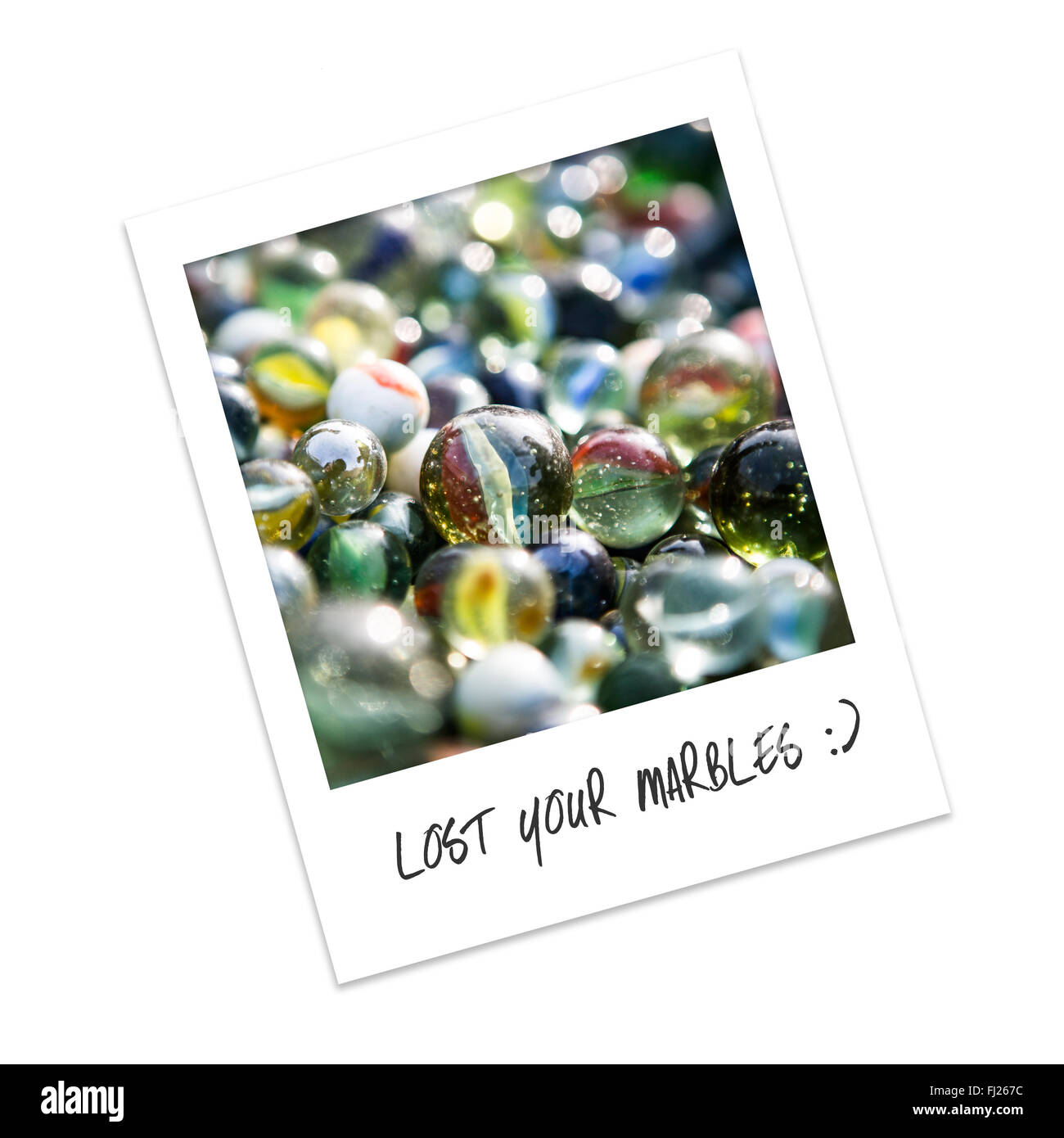 Polaroid Photo of Marbles - lost your marbles Stock Photo - Alamy