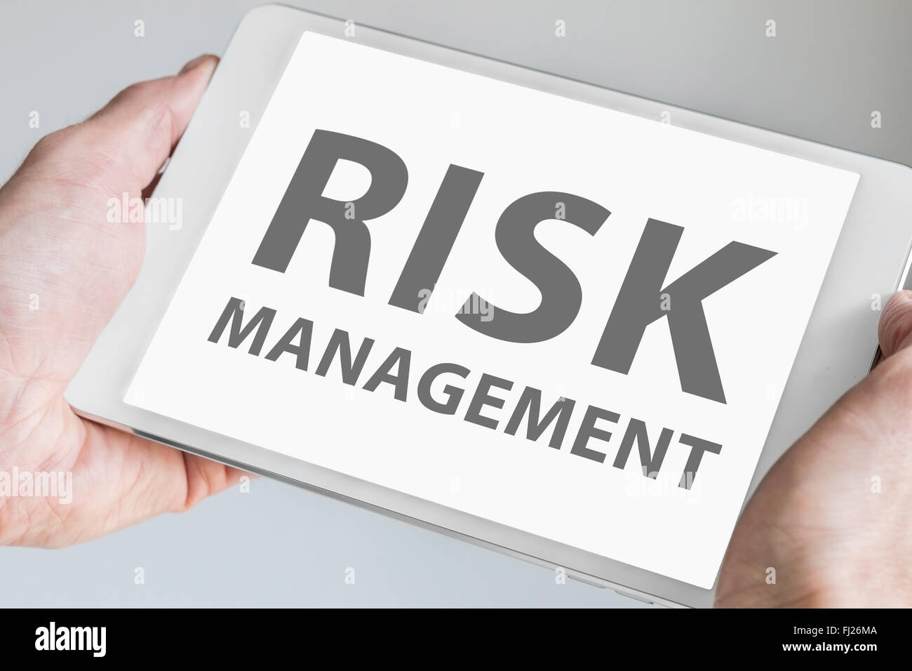 Digital risk Management texted displayed on touchscreen of modern ...