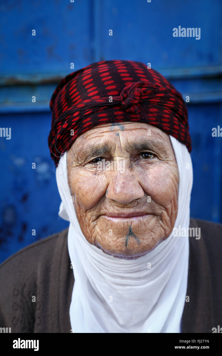 Portrait of an old Kurdish woman Diyarbakir with tatoos on her face ...