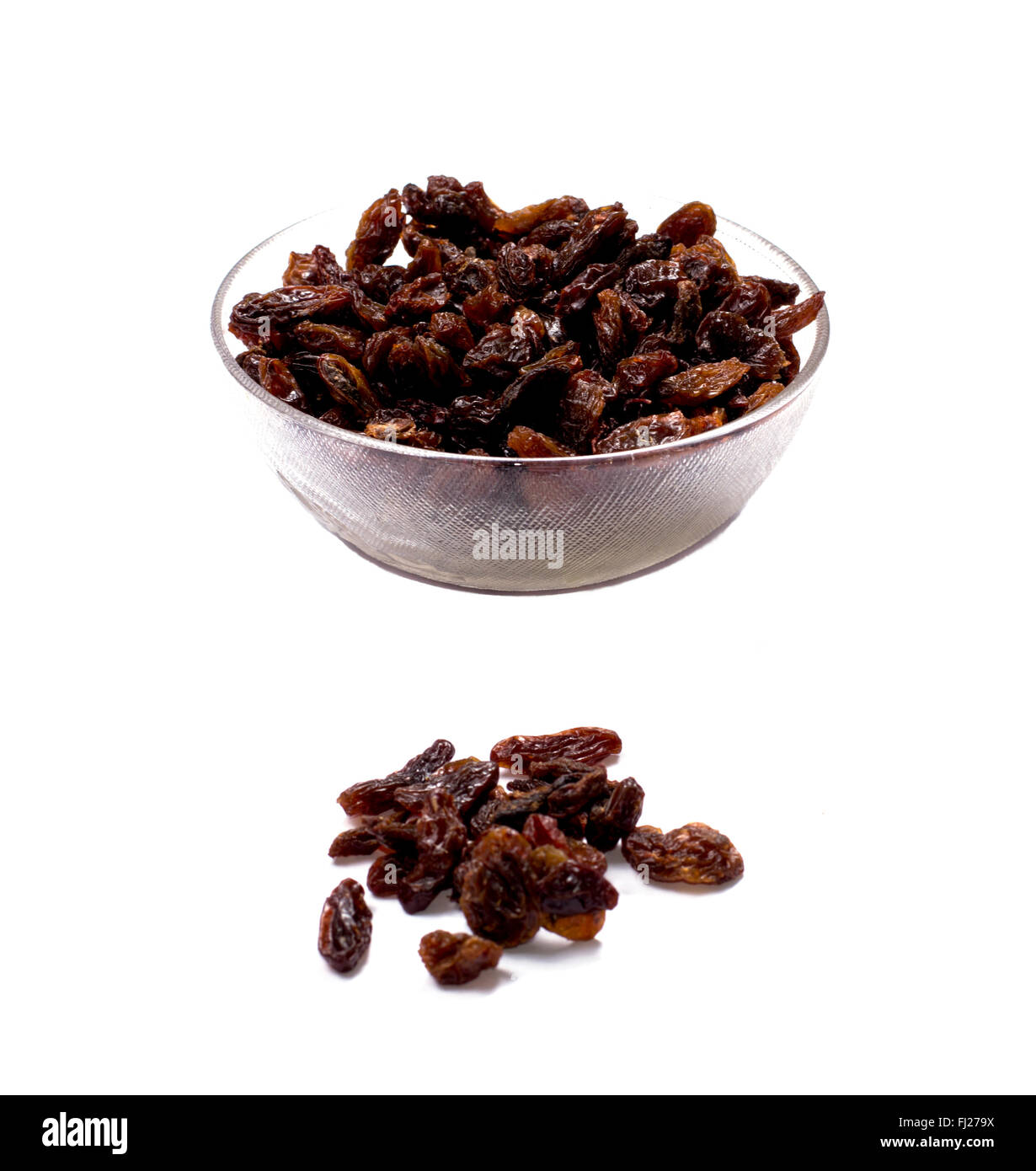plate with raisin and a row several grains of raisin Stock Photo - Alamy