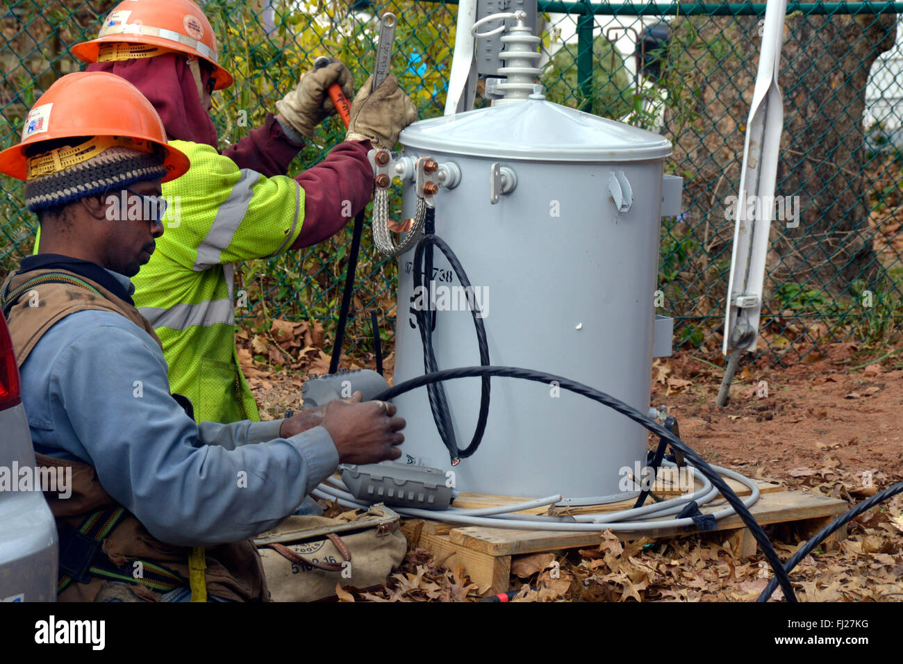 Utility Workers work on a electrical transformer Stock Photo - Alamy