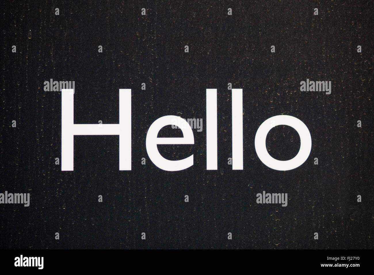 White Hello sign on black background Stock Photo - Alamy