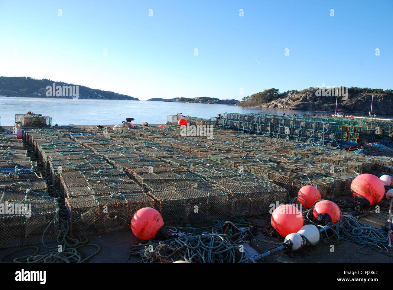 Cages for seafood in winter Stock Photo - Alamy