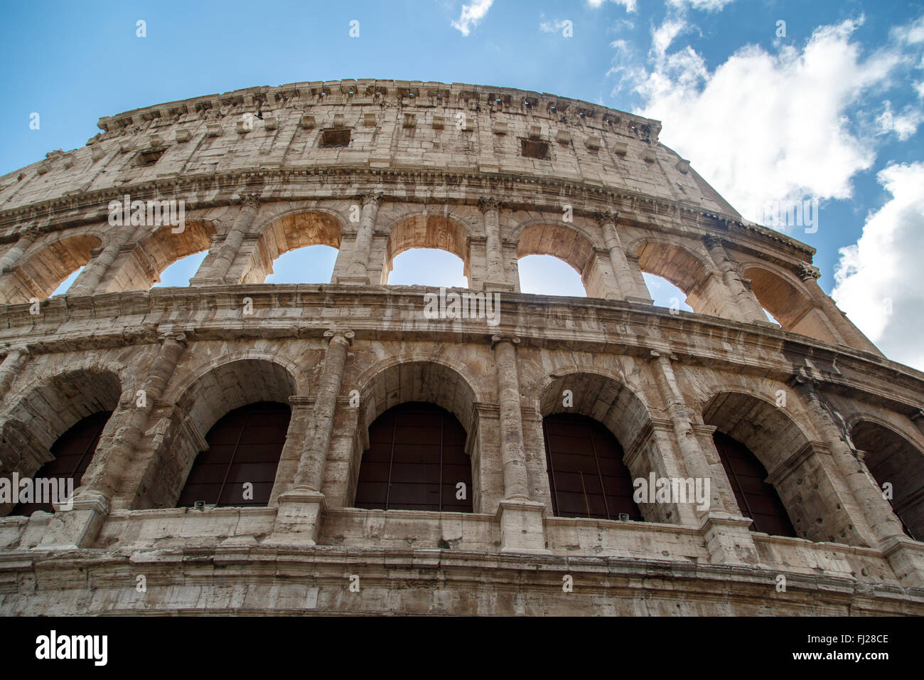 Bottom view of ancient amphitheater of Colosseum built by Vespasian and ...