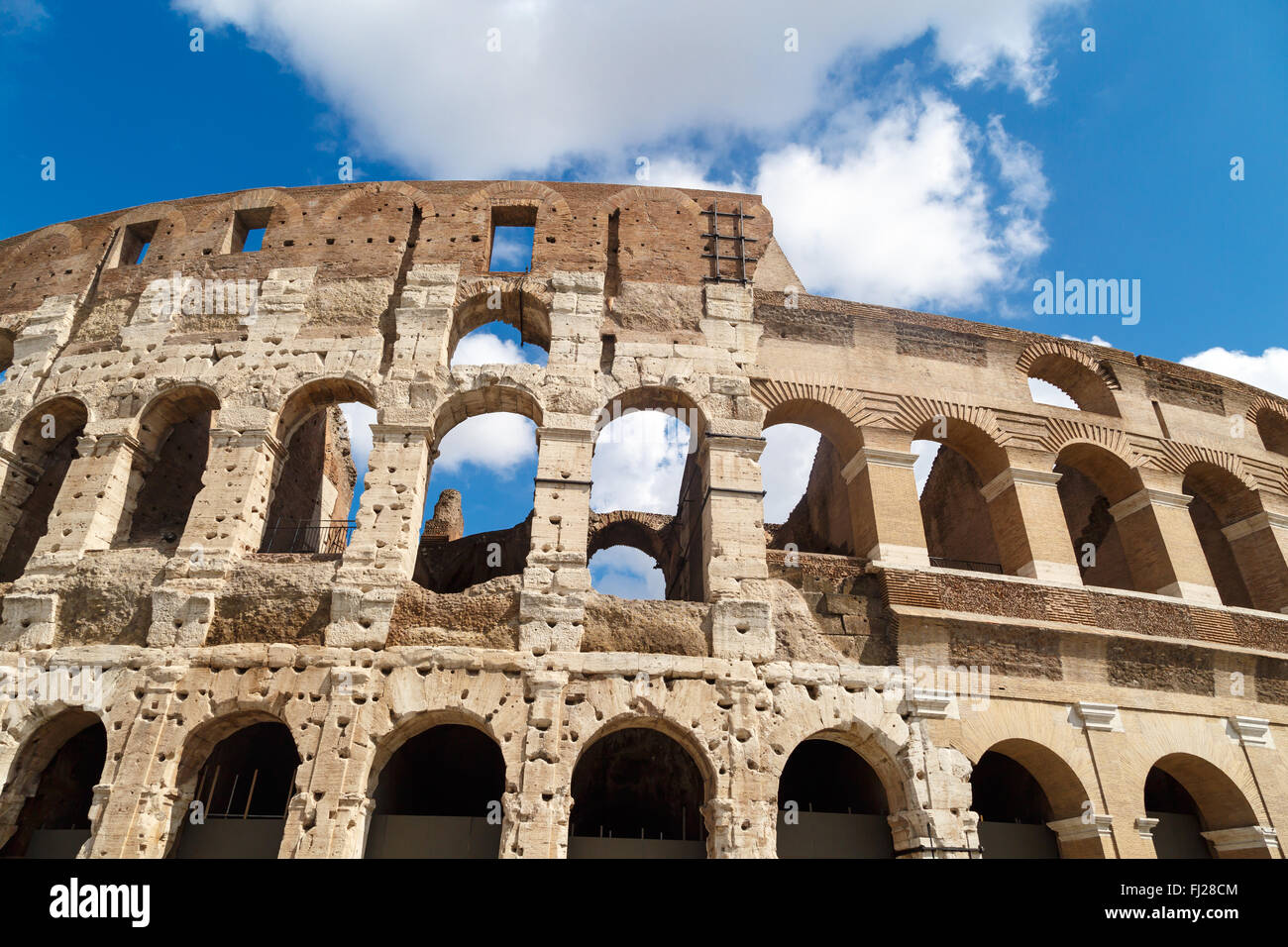 Bottom view of ancient amphitheater of Colosseum built by Vespasian and ...