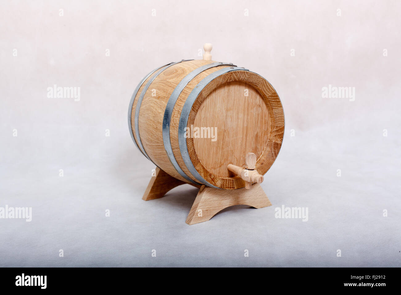 A barrel of alcohol on a white background Stock Photo - Alamy