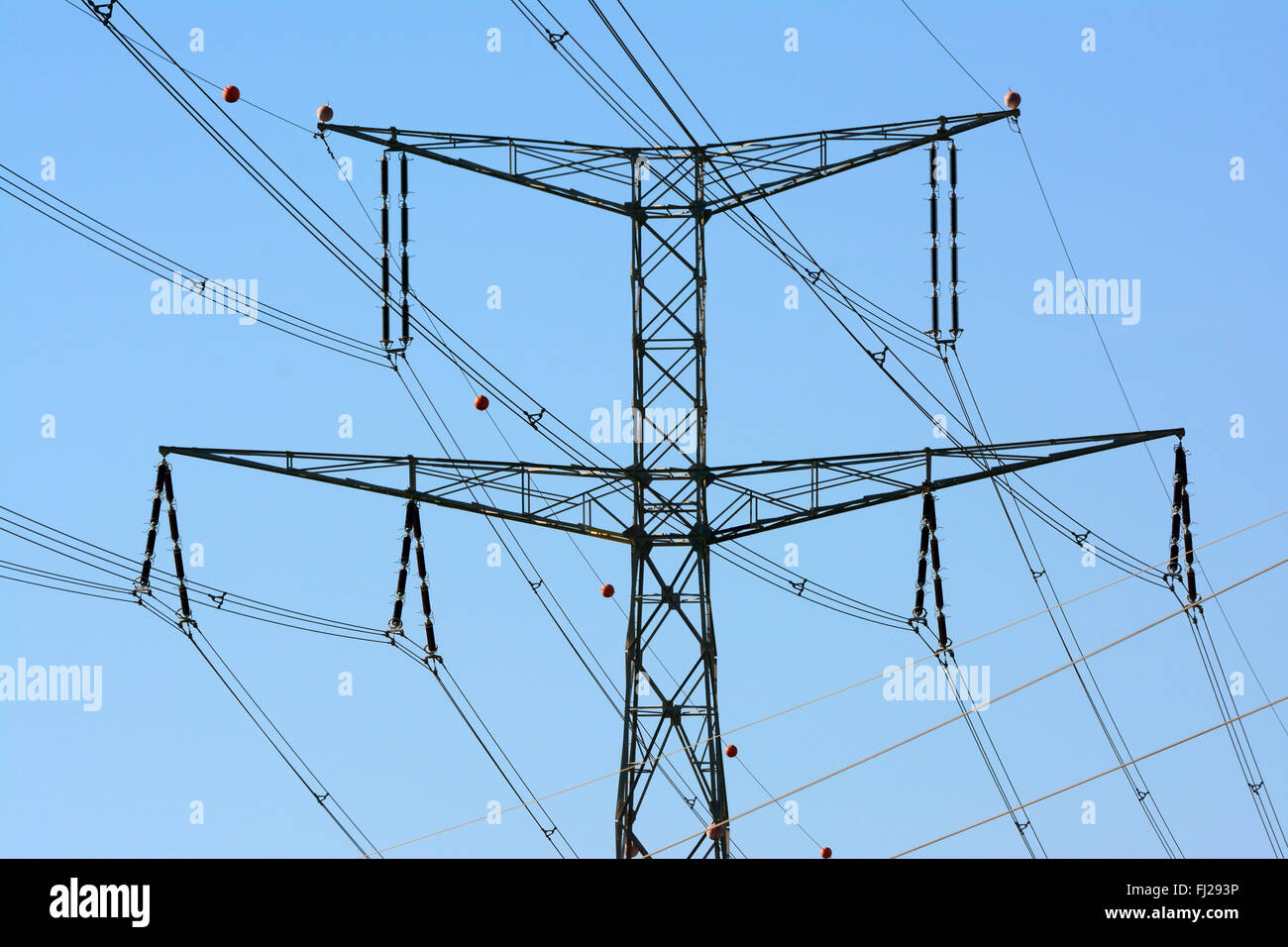 High voltage electricity pylon closeup Stock Photo - Alamy
