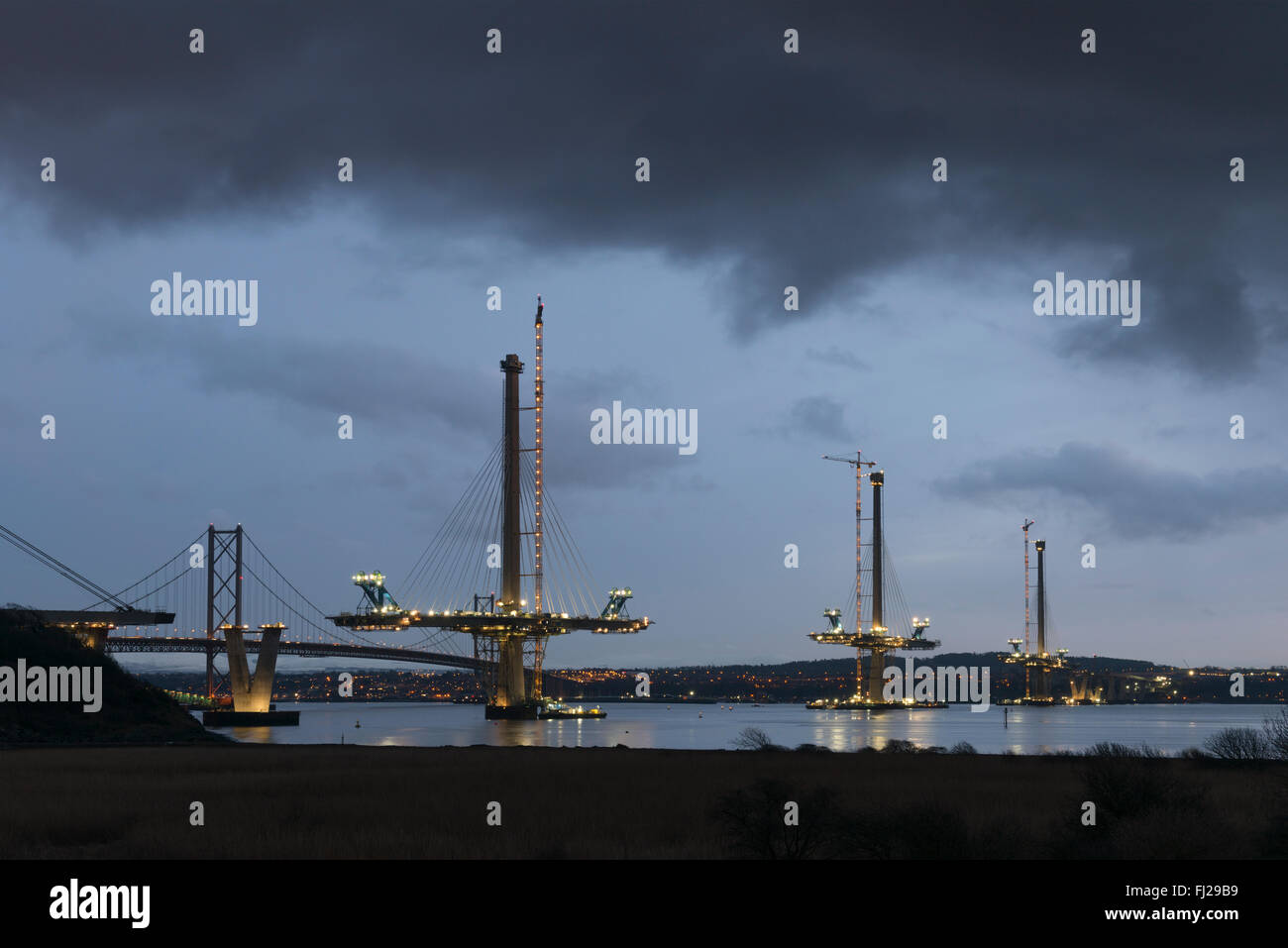 Queensferry Crossing under construction at dusk, looking towards South ...
