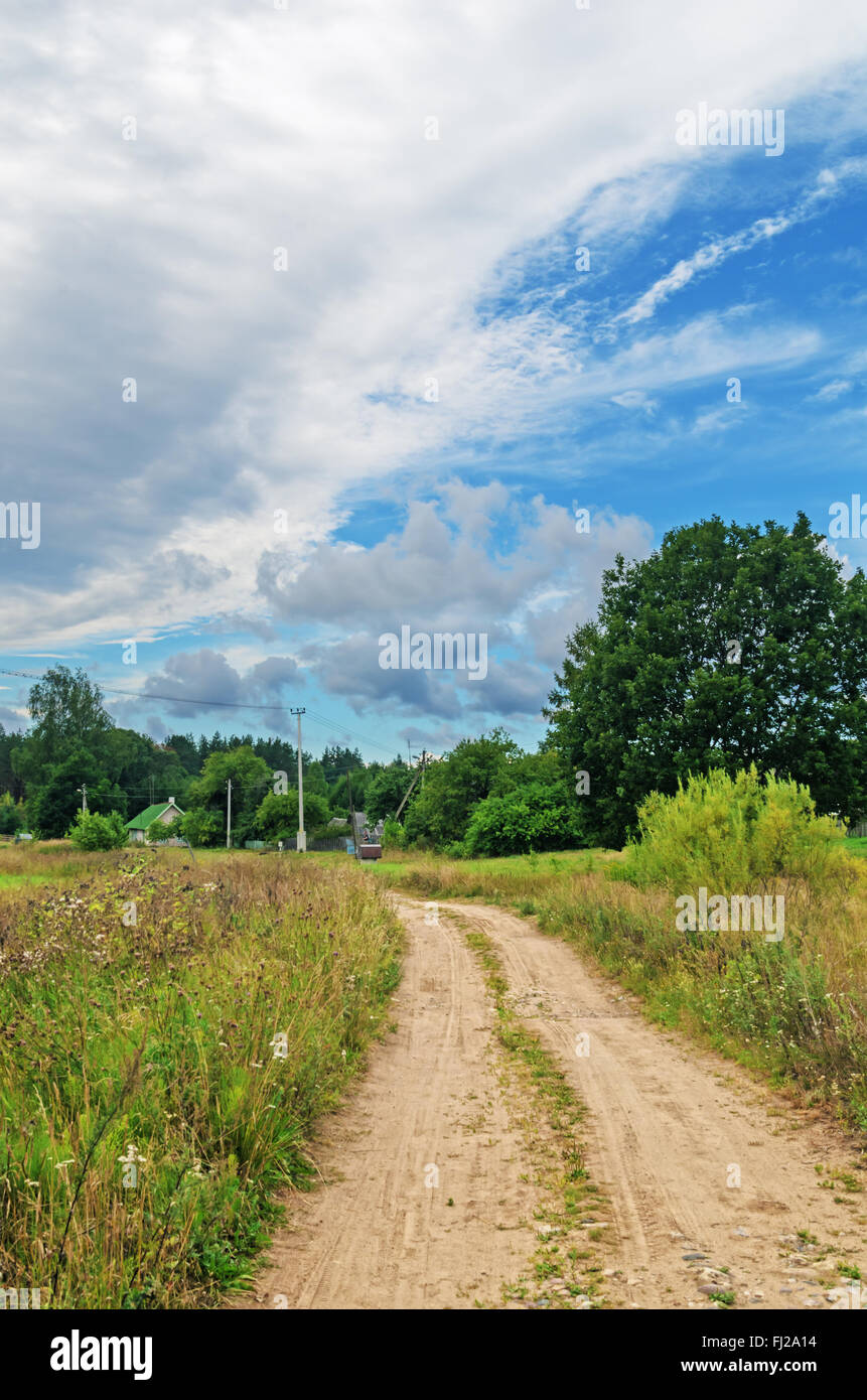 Village landscape with sand road Stock Photo - Alamy