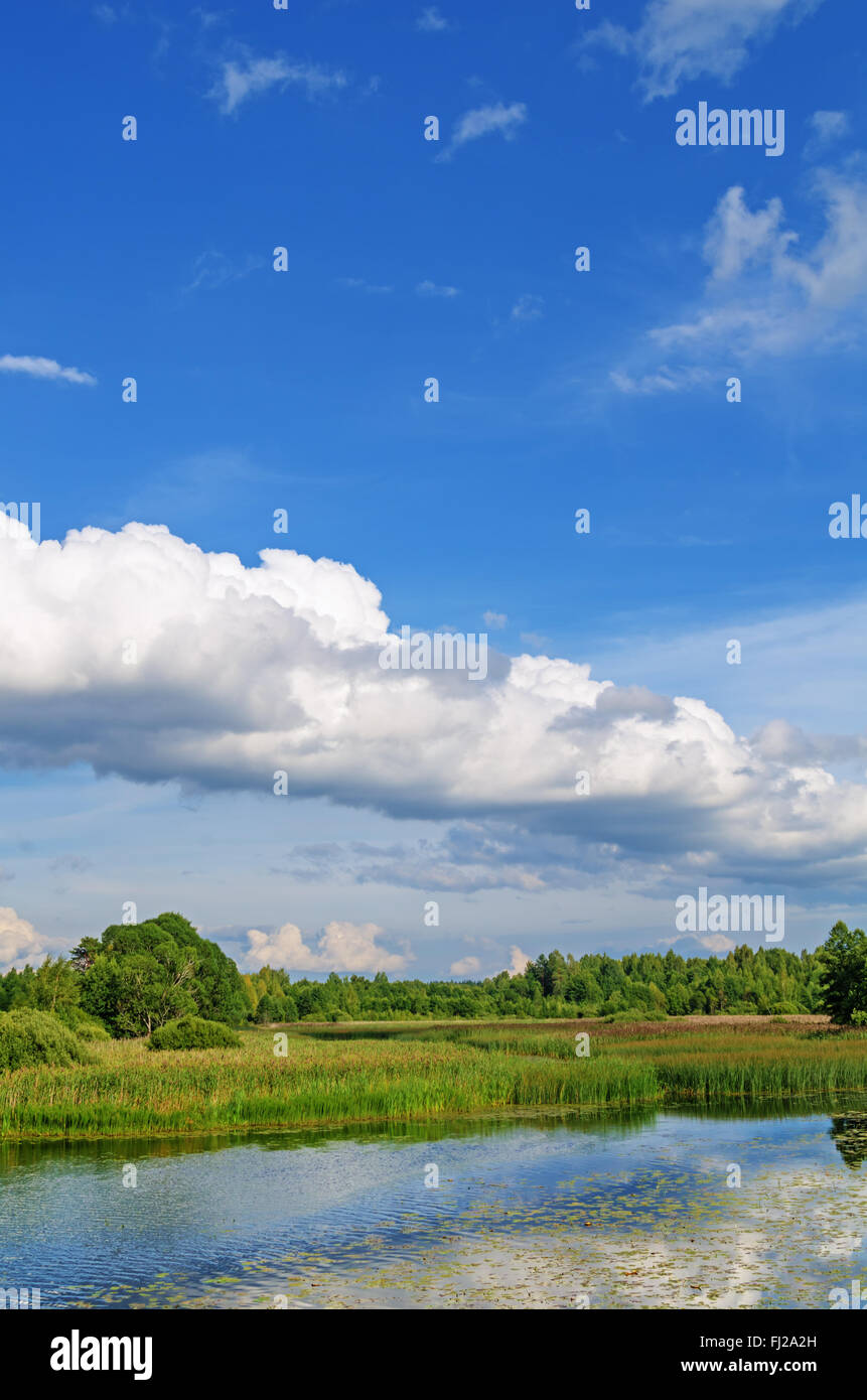 Clouds over river Stock Photo - Alamy