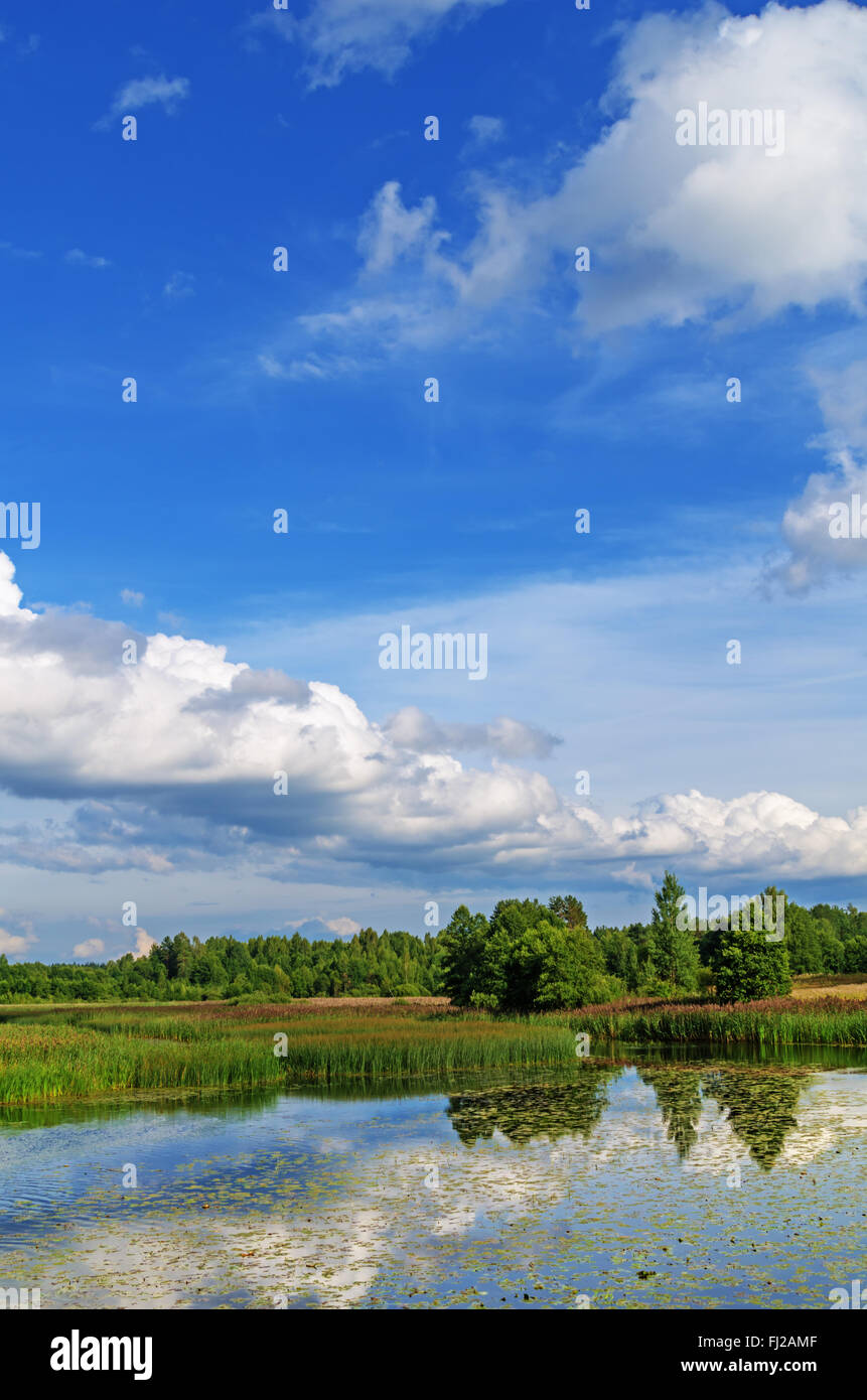 Clouds over river Stock Photo - Alamy