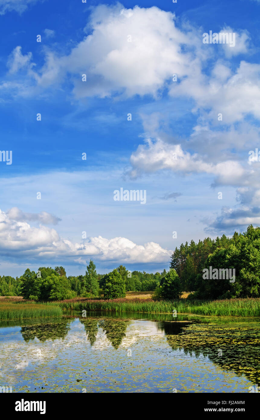 Clouds over river Stock Photo - Alamy
