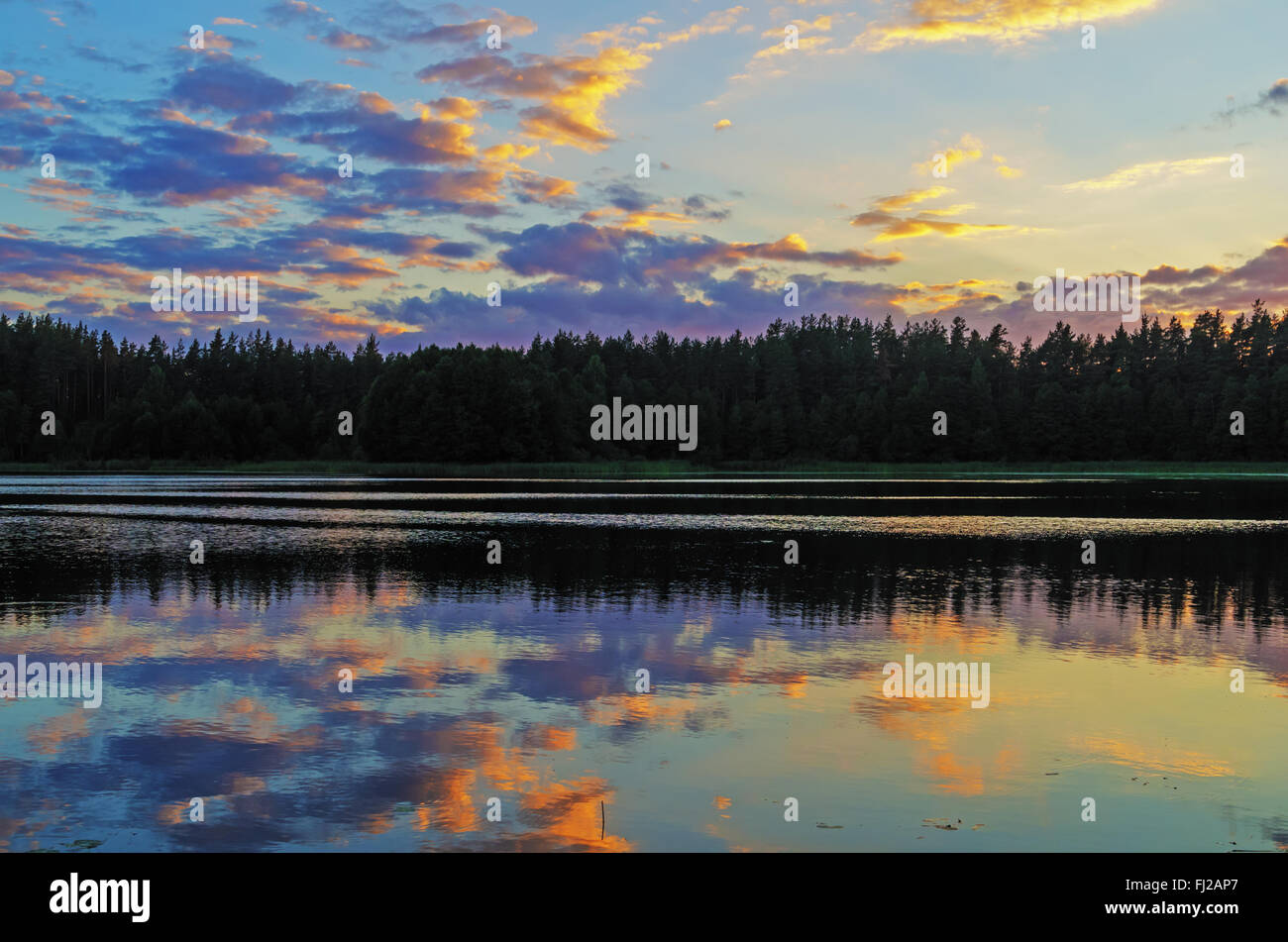 Pink sunset over lake Stock Photo - Alamy