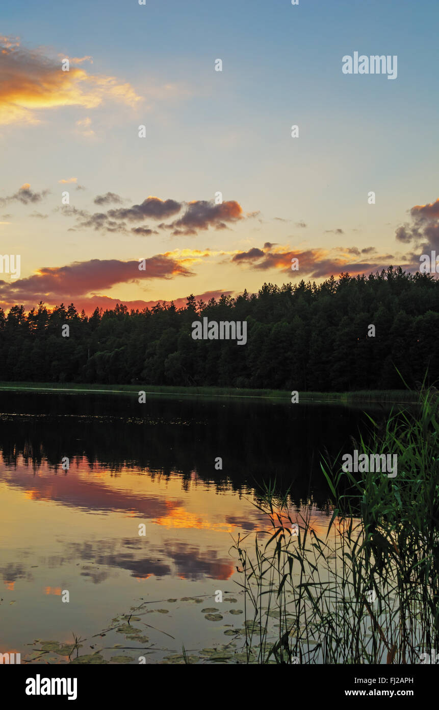 Pink sunset over lake Stock Photo - Alamy