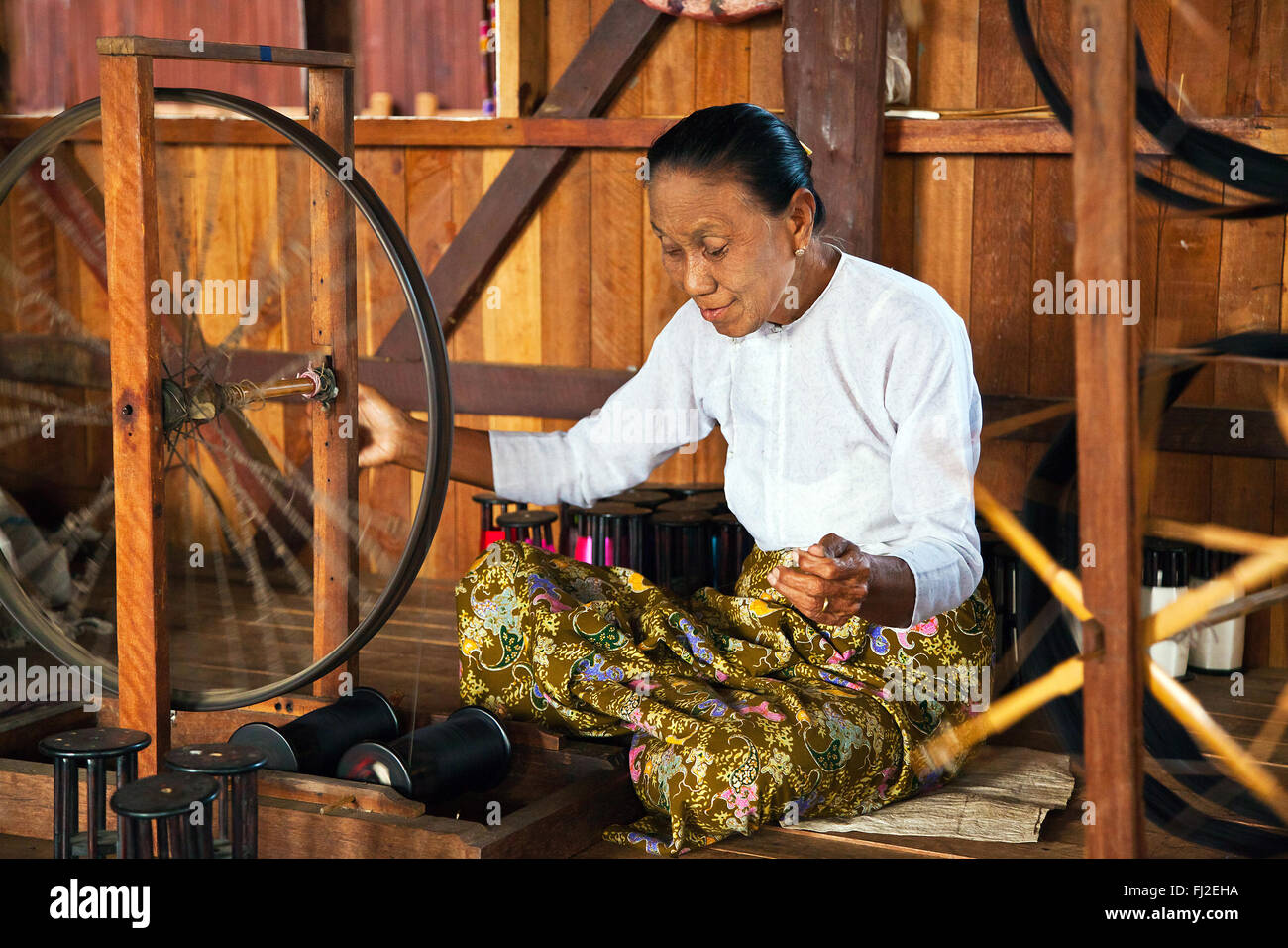 The weaving of LOTUS SILK fabric from the stalks of the lotus plant is ...