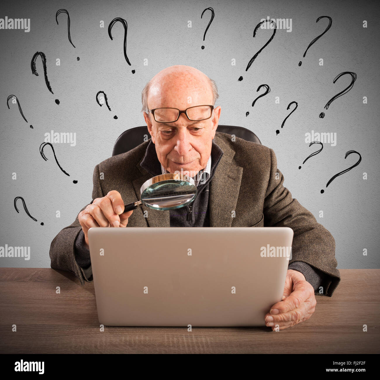 Confused man and technology hi-res stock photography and images - Alamy