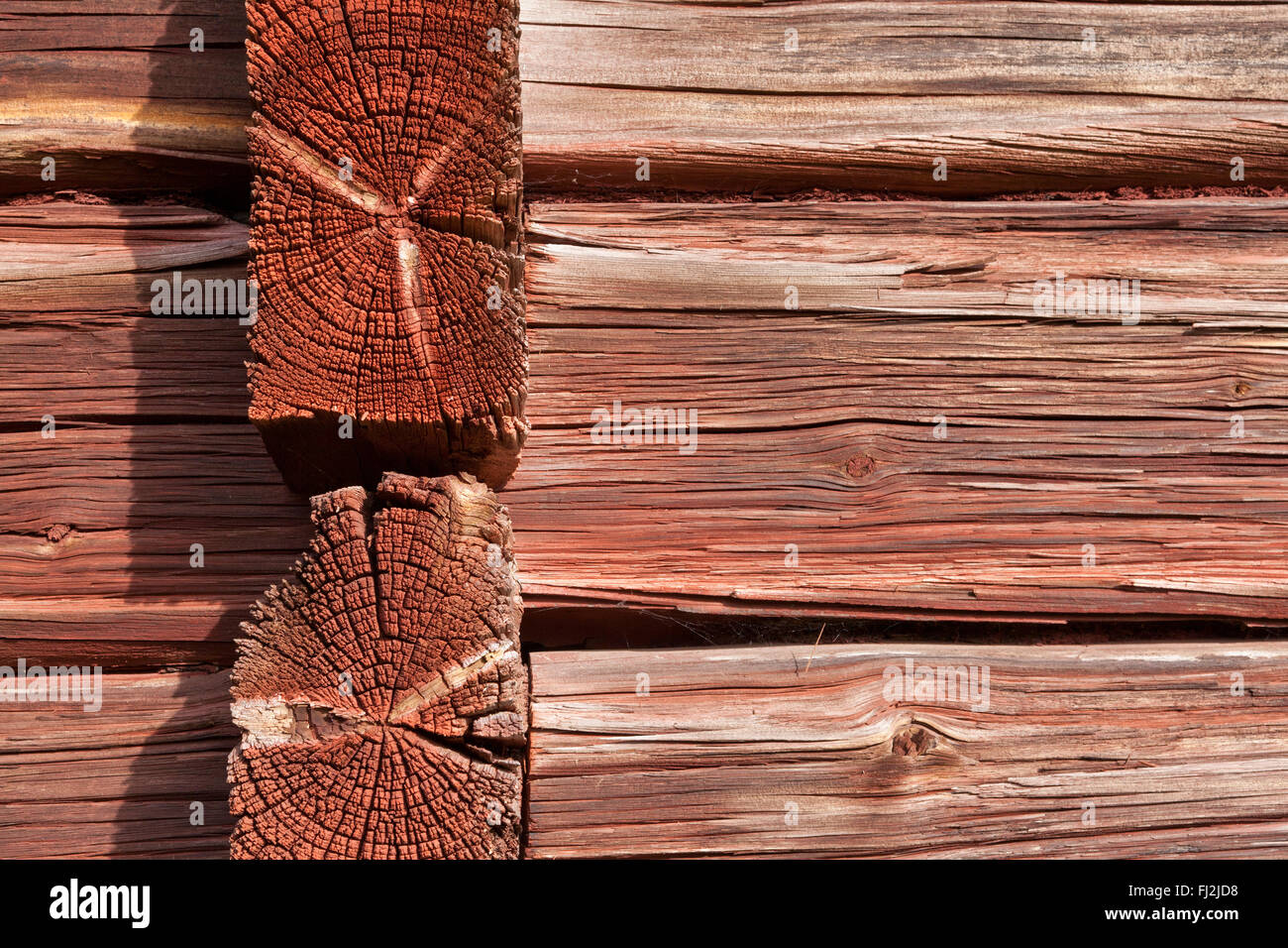 Closeup, macro of red painted logs, timber on a buildings wall. Ancient ...