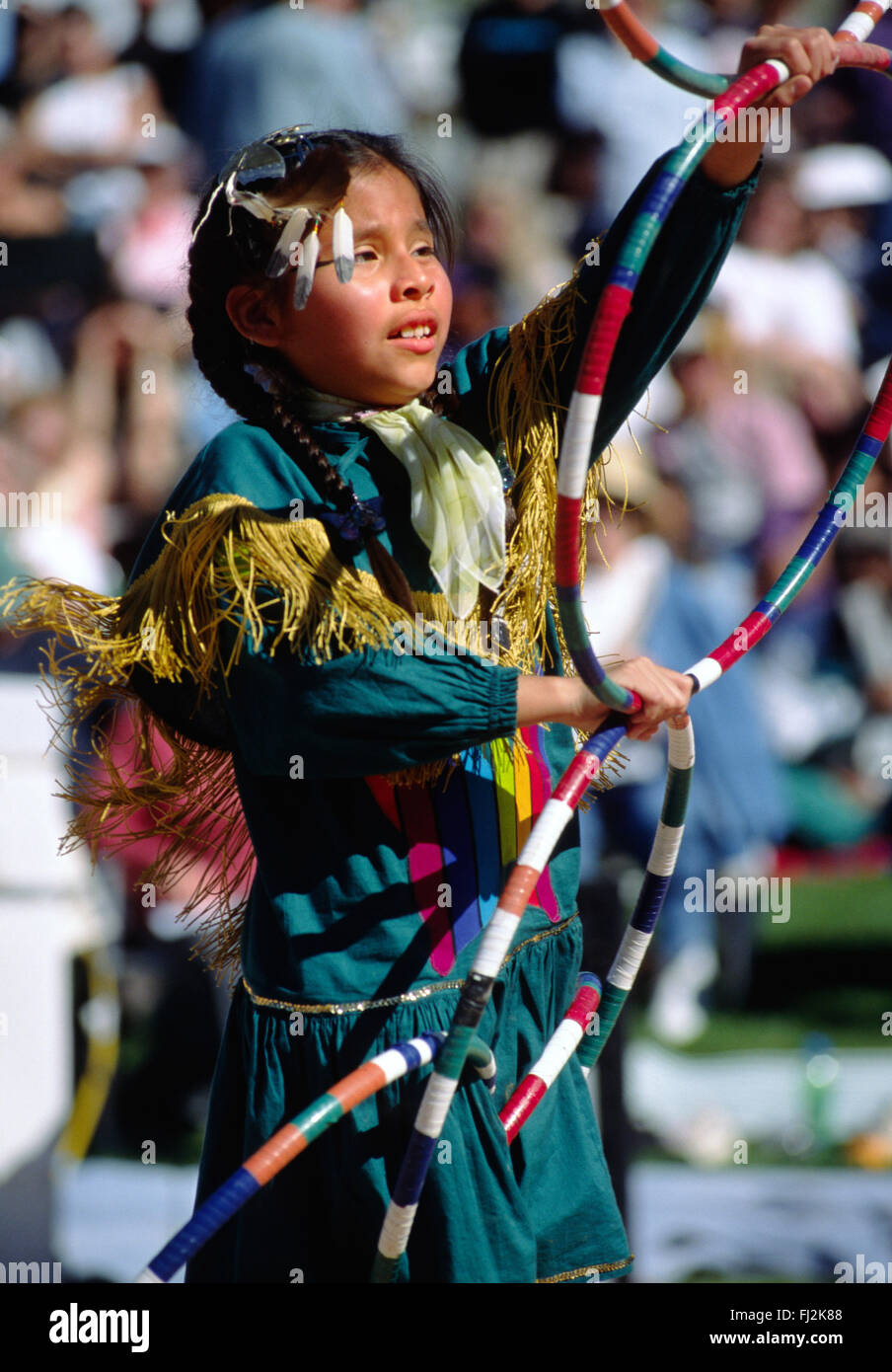 A young girl competes at the WORLD CHAMPIONSHIP HOOP DANCE CONTEST ...
