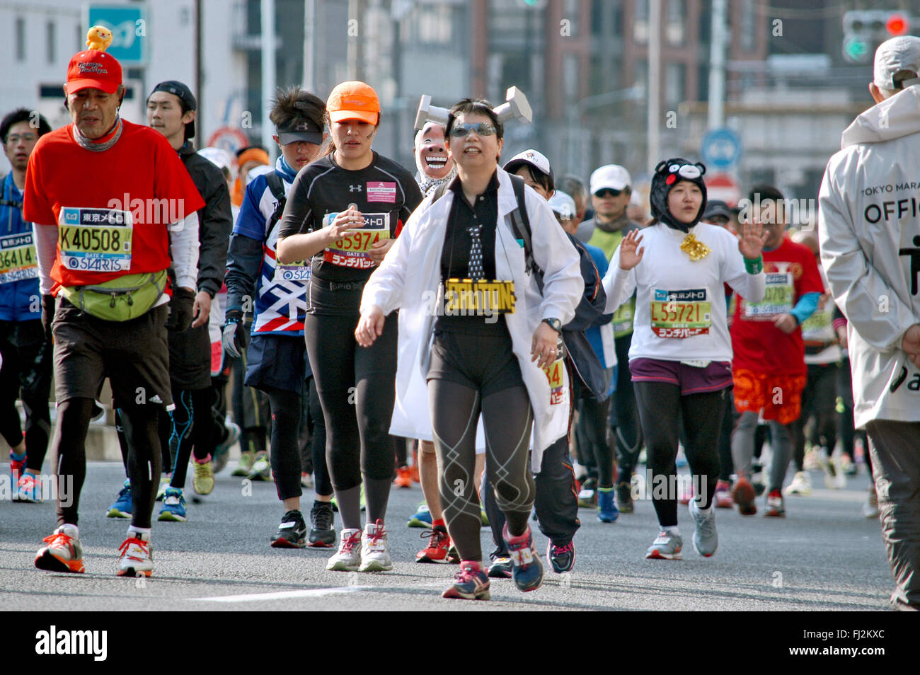 Tokyo, Japan. 28th Feb, 2016. Tokyo Marathon runners dress up in ...