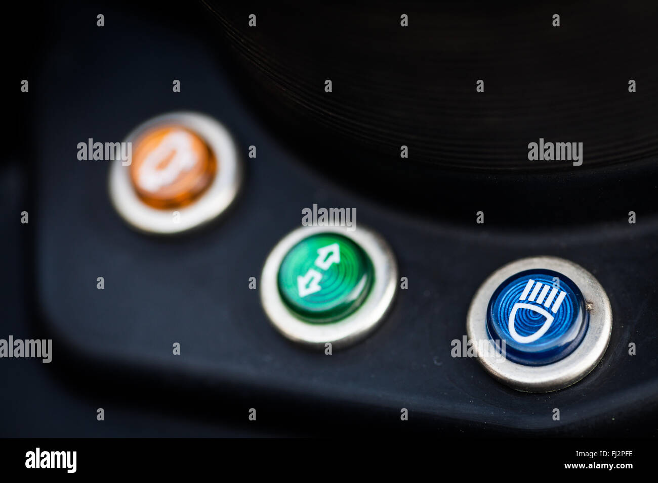 Color close-up of a motorcycle high beam indicator on the dashboard ...