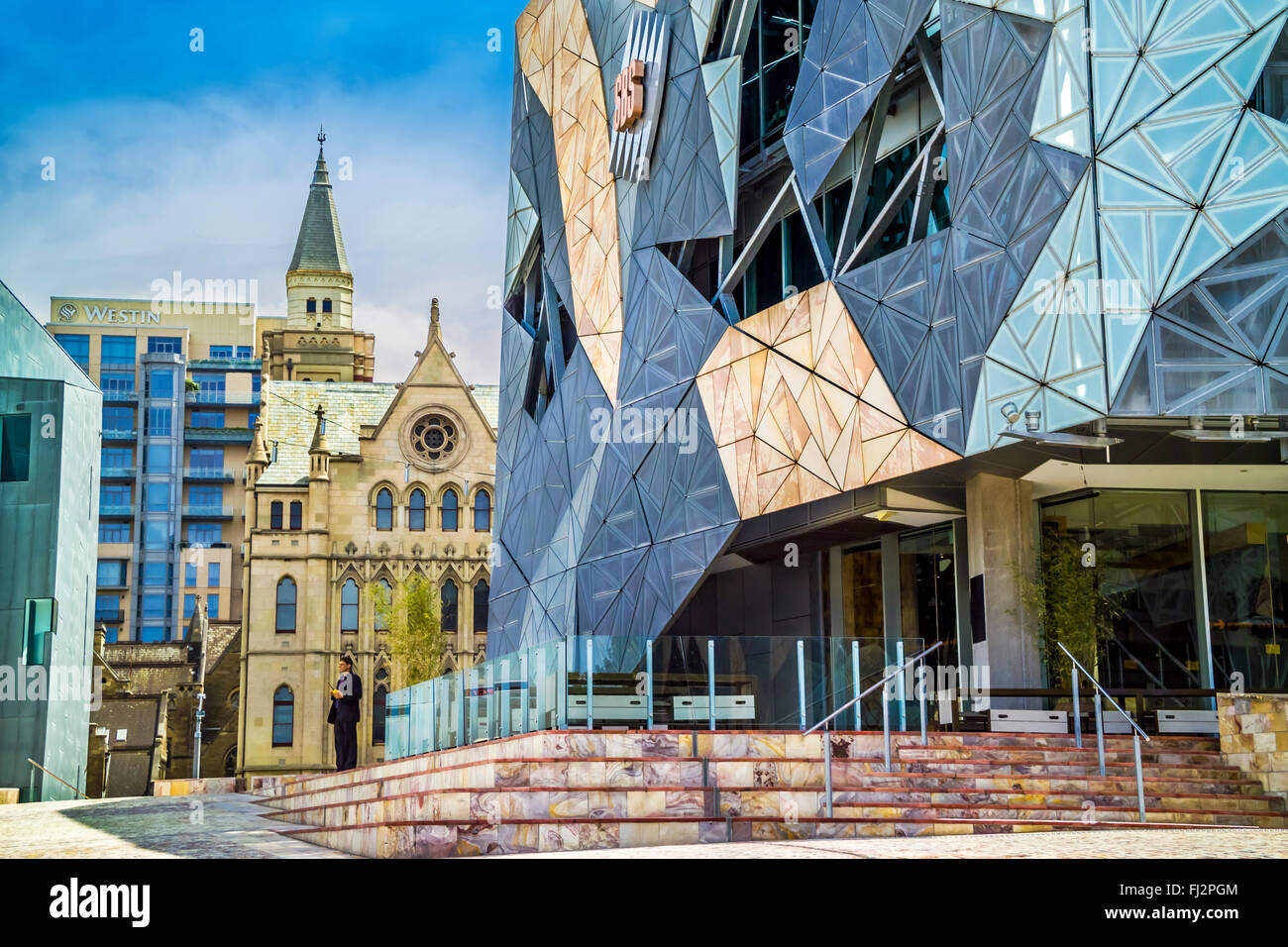 The steps leading to entrance of Federation Square against traditional ...