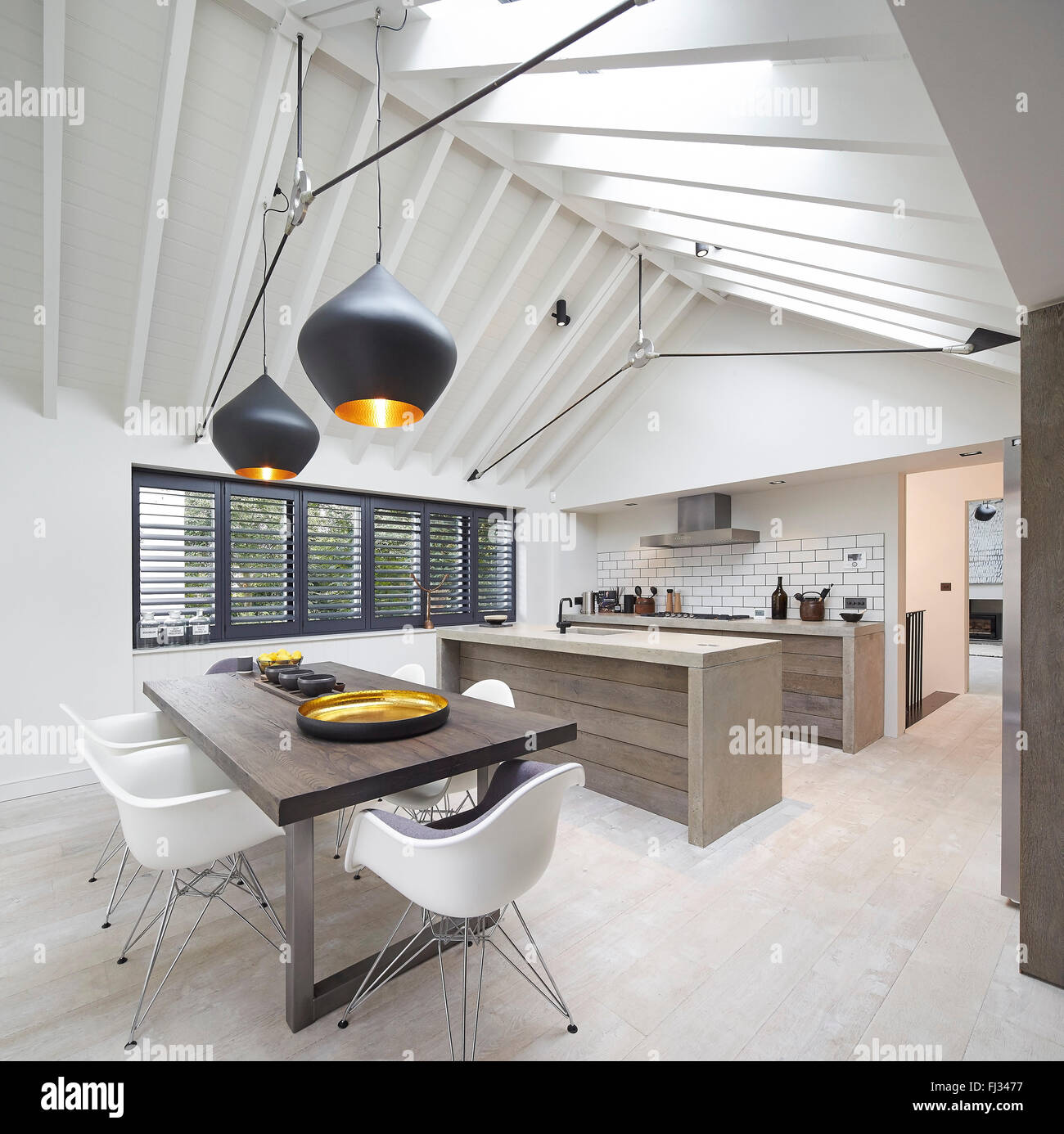 Open plan kitchen and dining area with exposed ceiling. Orleans Road ...