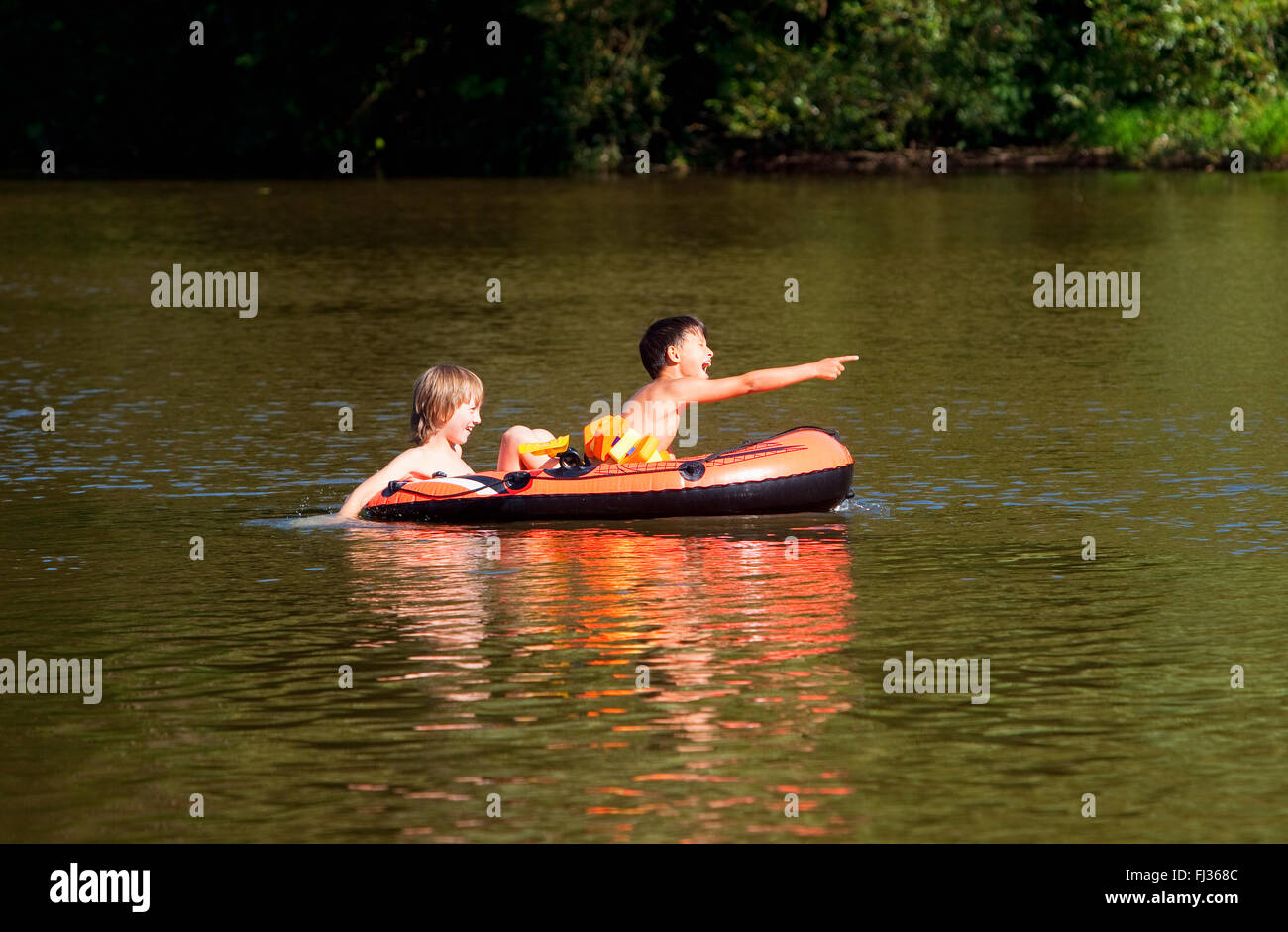 Inflatable boat children hi-res stock photography and images - Alamy