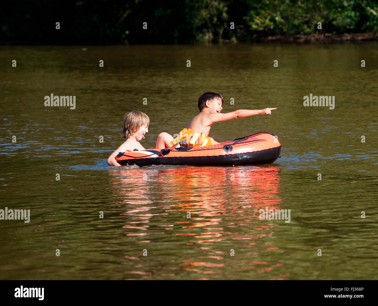 Inflatable boat children hi-res stock photography and images - Alamy