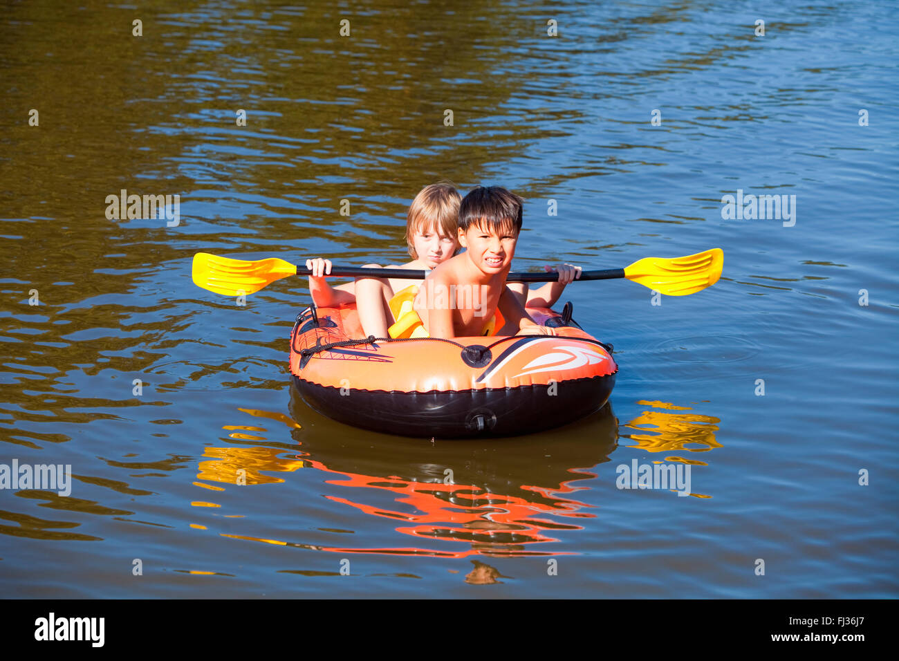 Inflatable boat children hi-res stock photography and images - Alamy