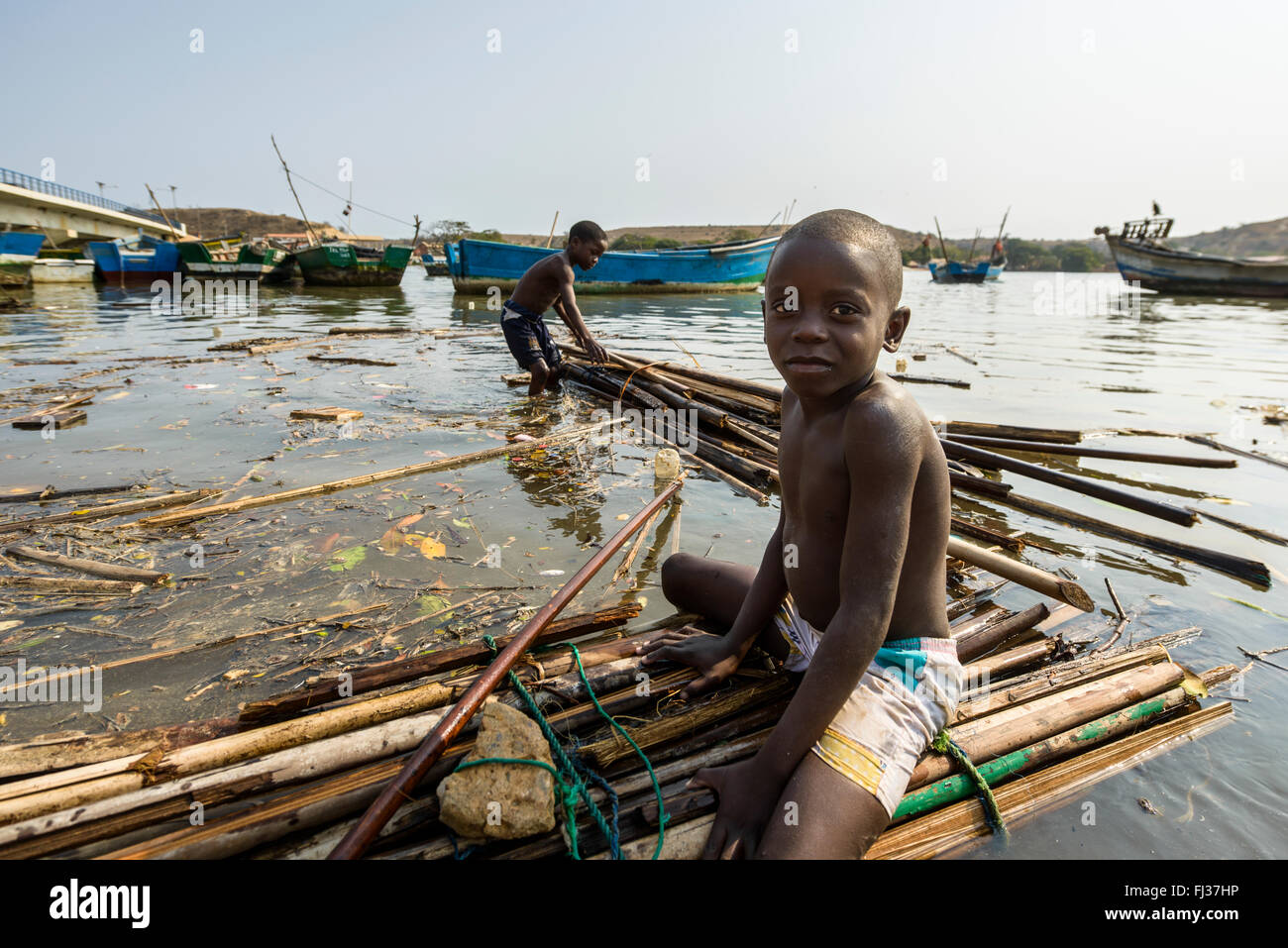 Boys gather wood, Angola, Africa Stock Photo - Alamy