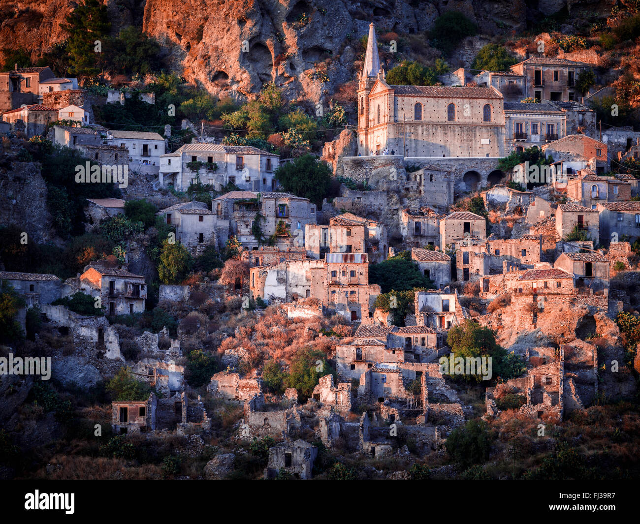 The ghost town of Pentedattilo at sunset Stock Photo - Alamy
