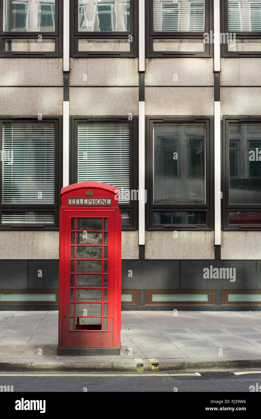 A classic red telephone box in Victoria Street, City of Westminster ...