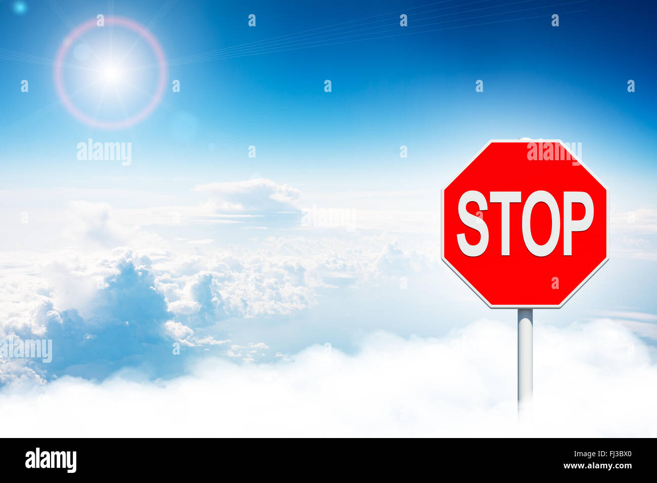 Road sign stop in clouds Stock Photo - Alamy