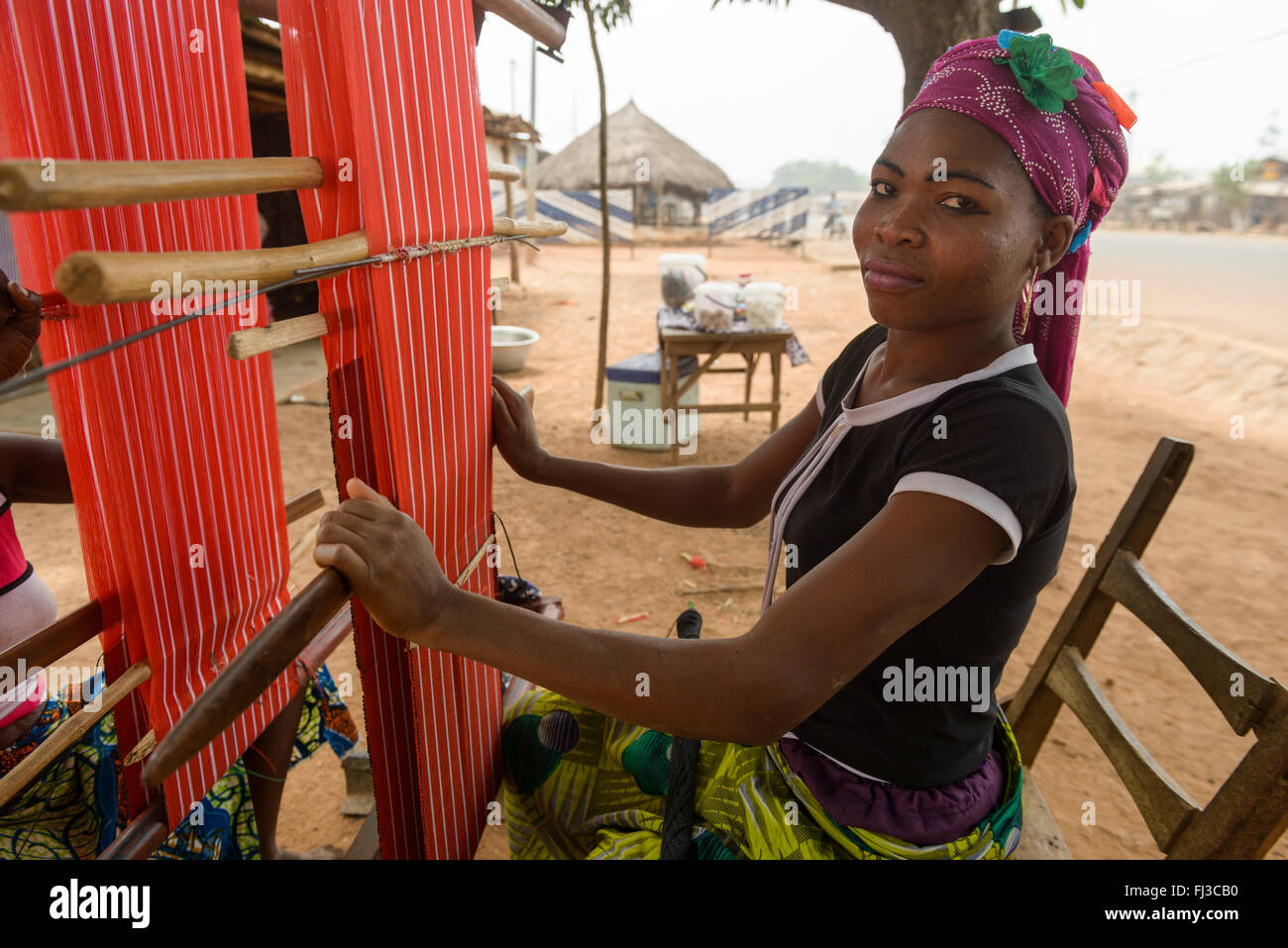 Girls and women working on their looms, Benin, Africa Stock Photo - Alamy
