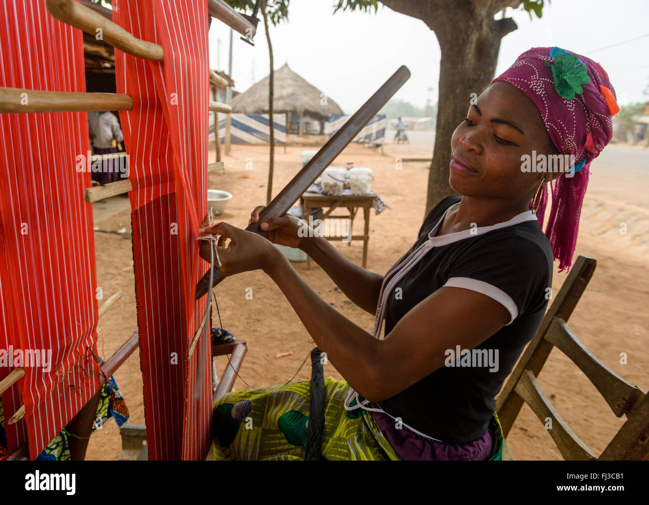 Girls and women working on their looms, Benin, Africa Stock Photo - Alamy