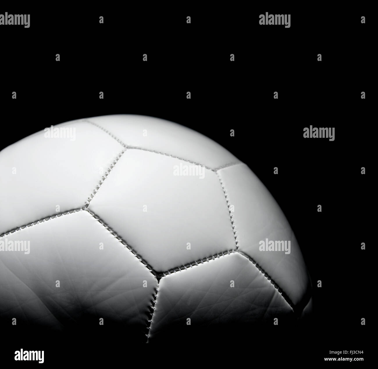 Soccer Ball isolated on black Stock Photo - Alamy